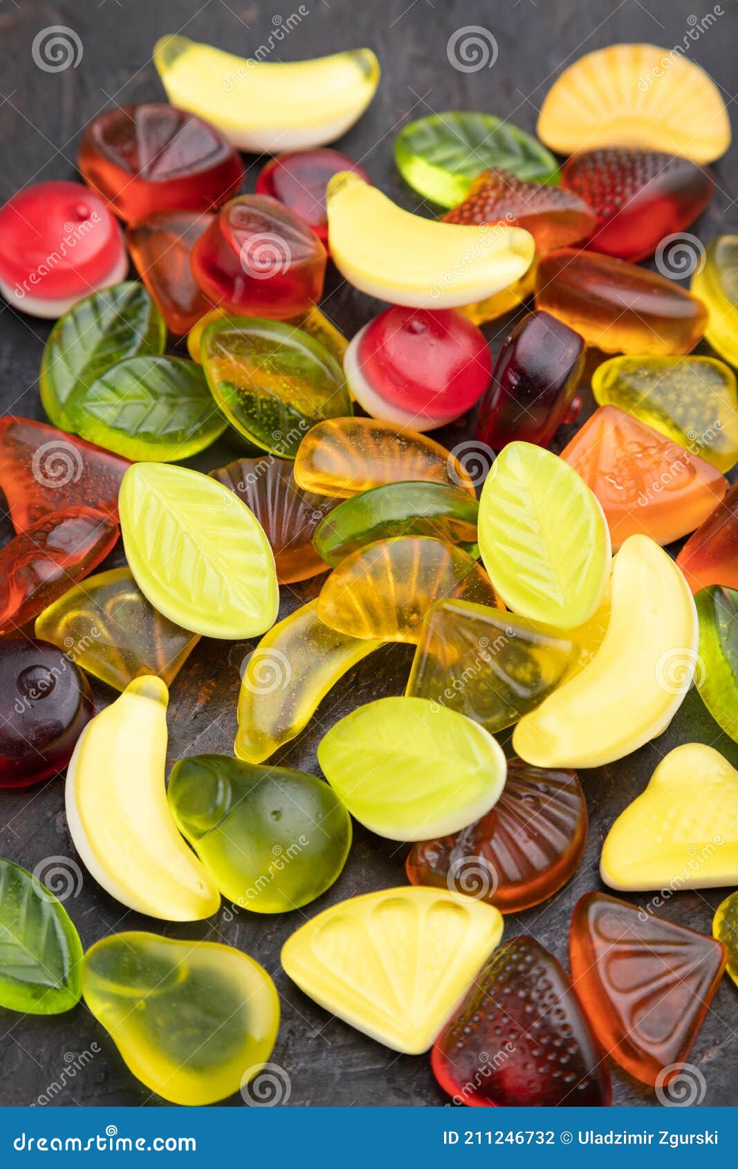 Various Jelly Candies on Black Concrete Background. Close Up, Side View ...
