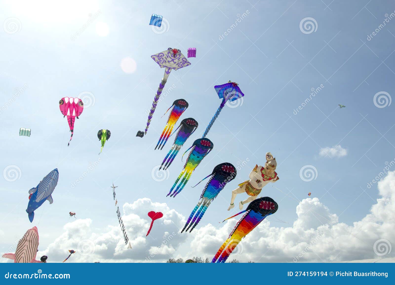 Various Kites in the Sky and Sun Rays Stock Photo - Image of activity ...