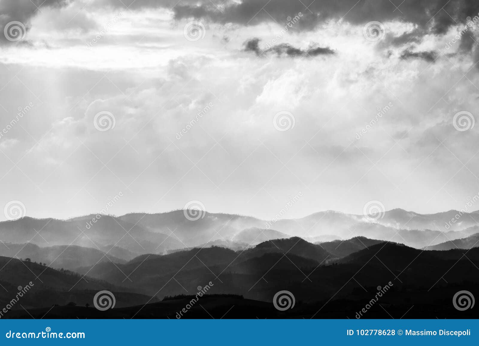 Various Layers of Hills and Mountains with Mist between Them, Wi Stock ...