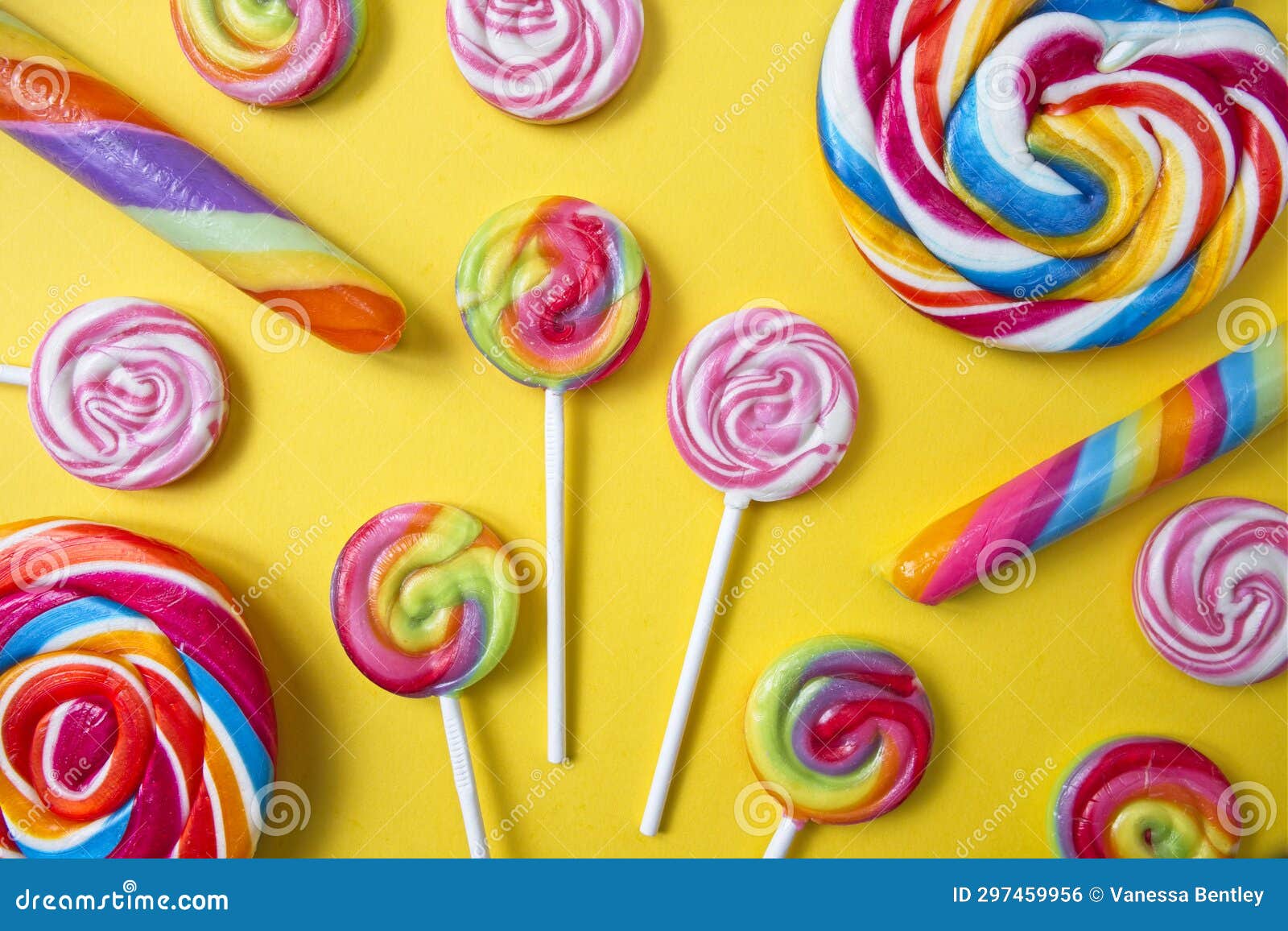 Various Lollipops in Bright and Bold Colours on a Yellow Background ...