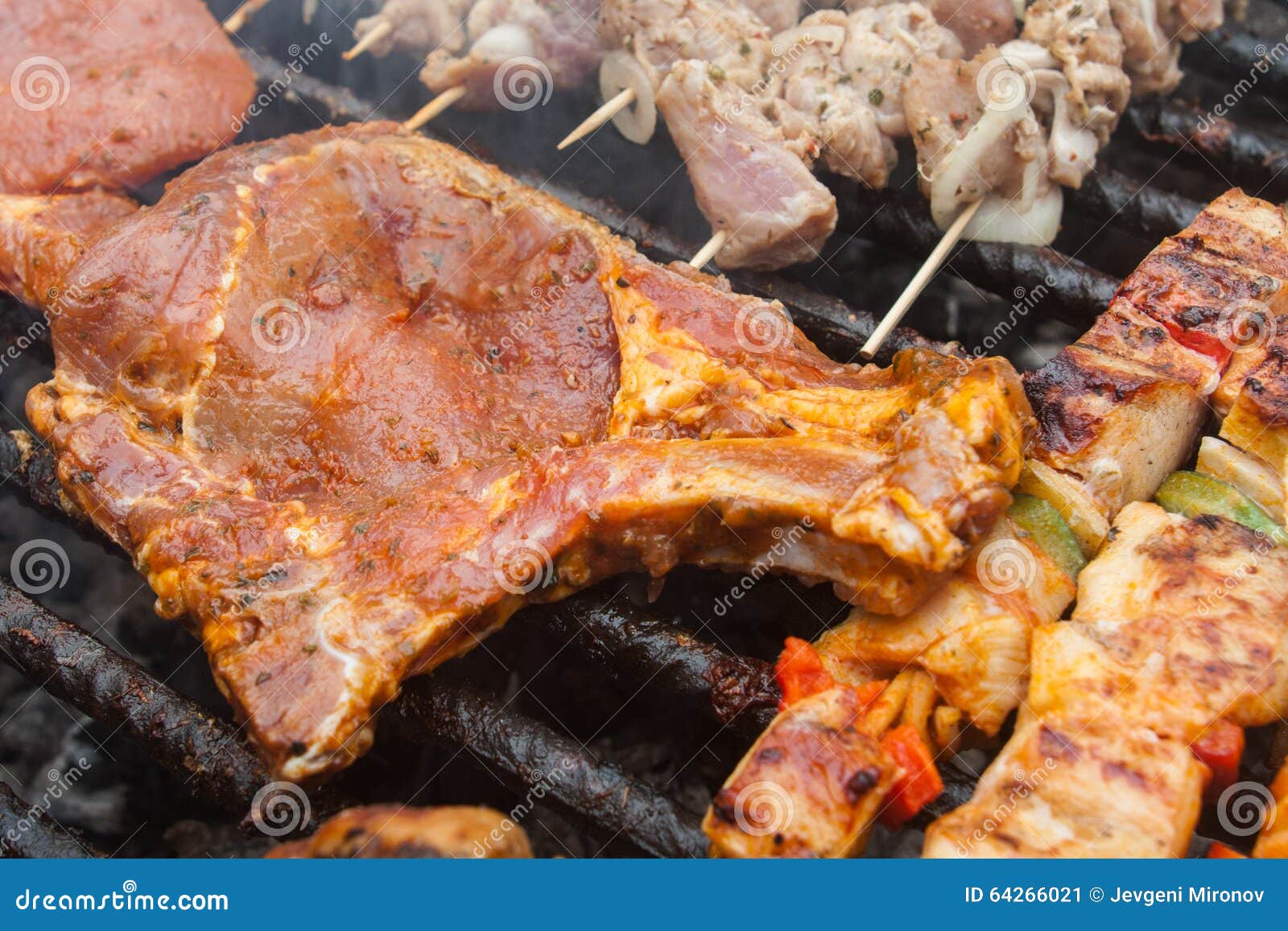Various Meat Chicken Wings Steaks Grilled on Brazier Stock Image ...
