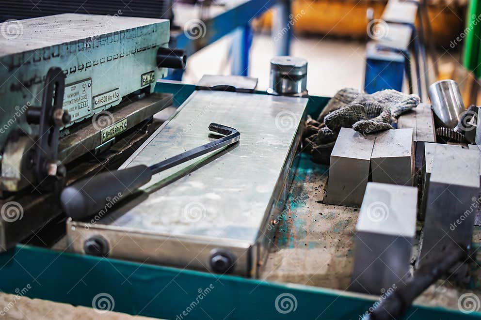 Various Metalworking Tools Arranged on a Workbench in a Workshop ...