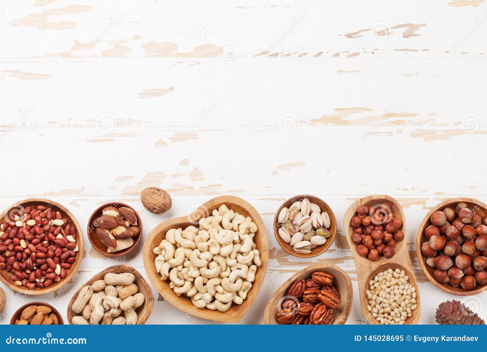 Various Nuts Selection on Wooden Table Stock Image - Image of almond ...