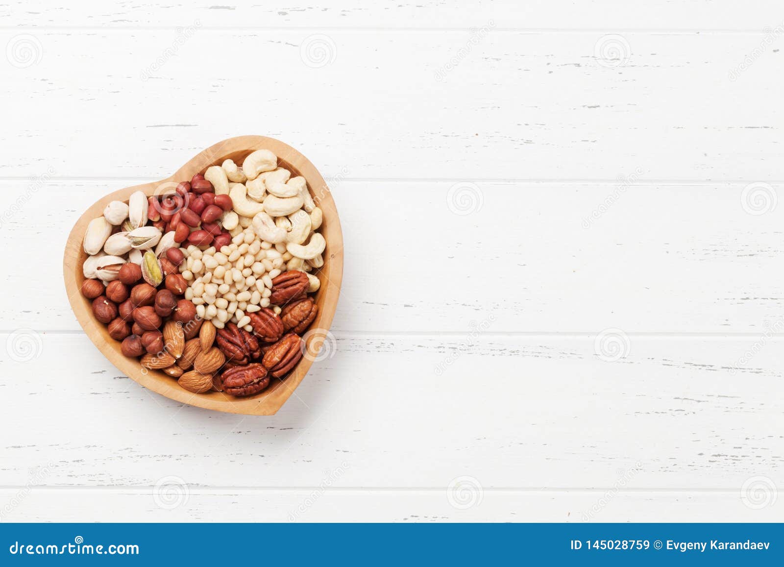 Various Nuts Selection on Wooden Table Stock Image - Image of almond ...