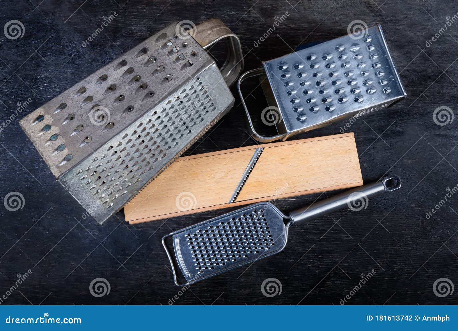 Various Old Kitchen Graters on the Black Surface Stock Photo - Image of ...