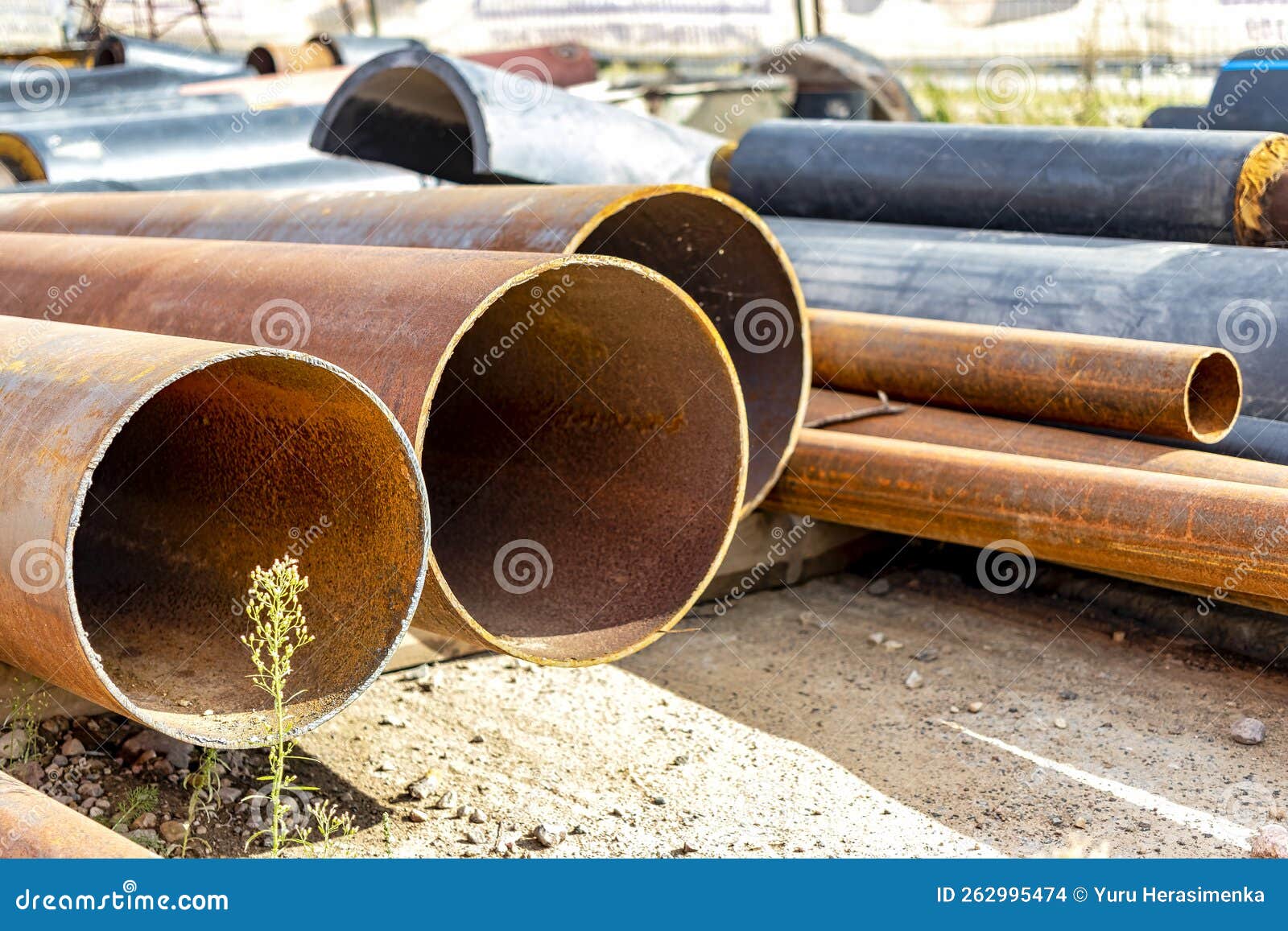 Various Pipes Used on a Construction Site. Pipes of Different Diameters ...