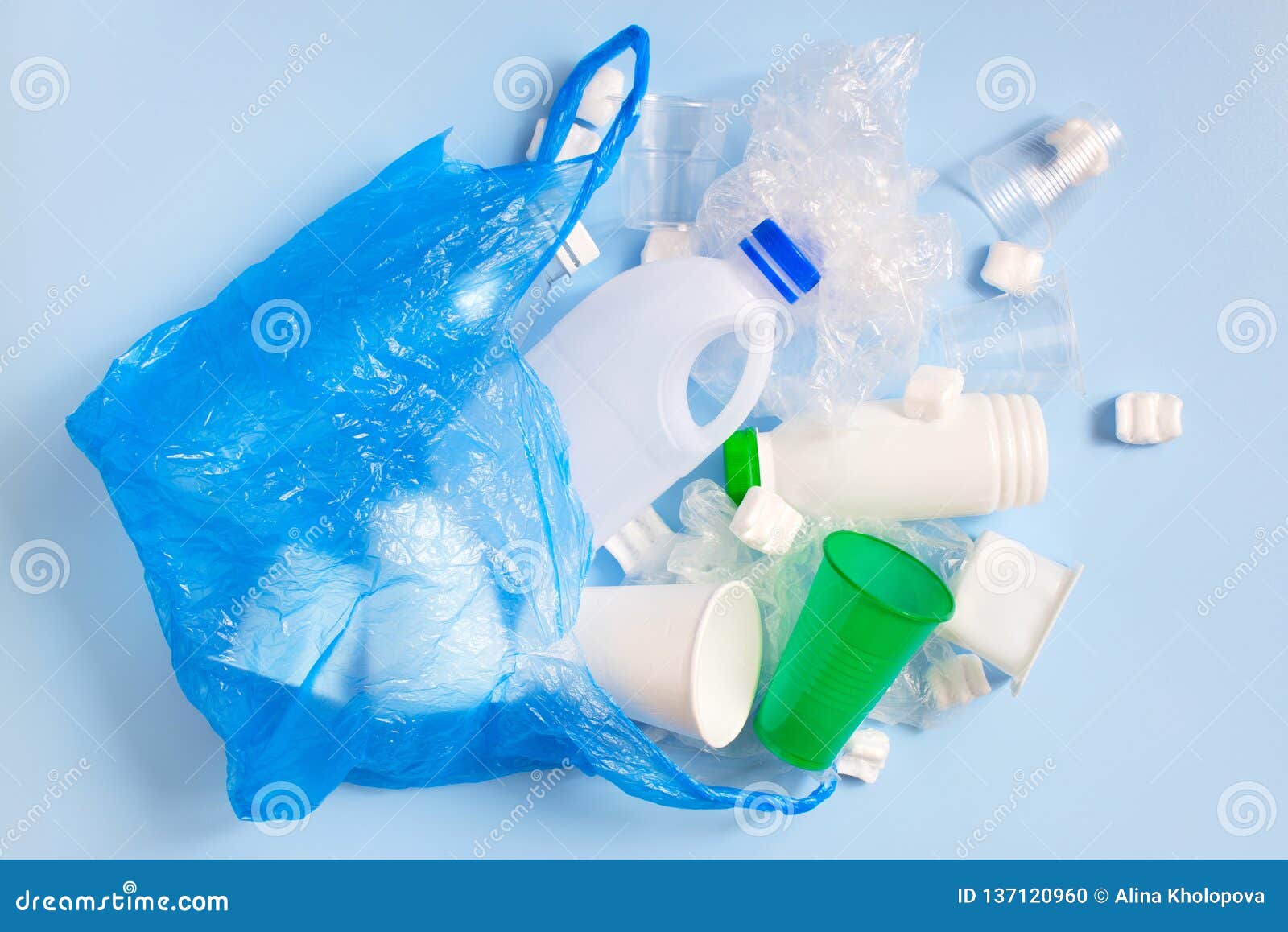 Various Plastic Garbage on the Light Blue Background Stock Photo ...