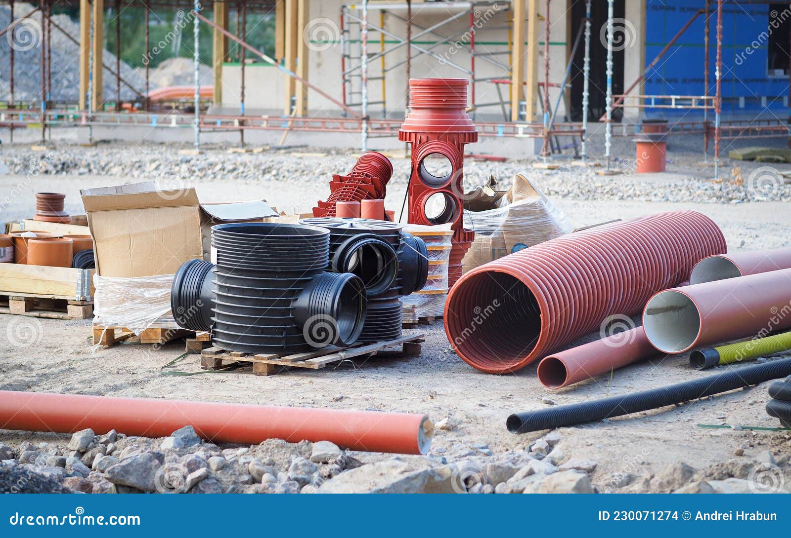 Various Plastic Pipes and Other Materials on the Construction Site ...