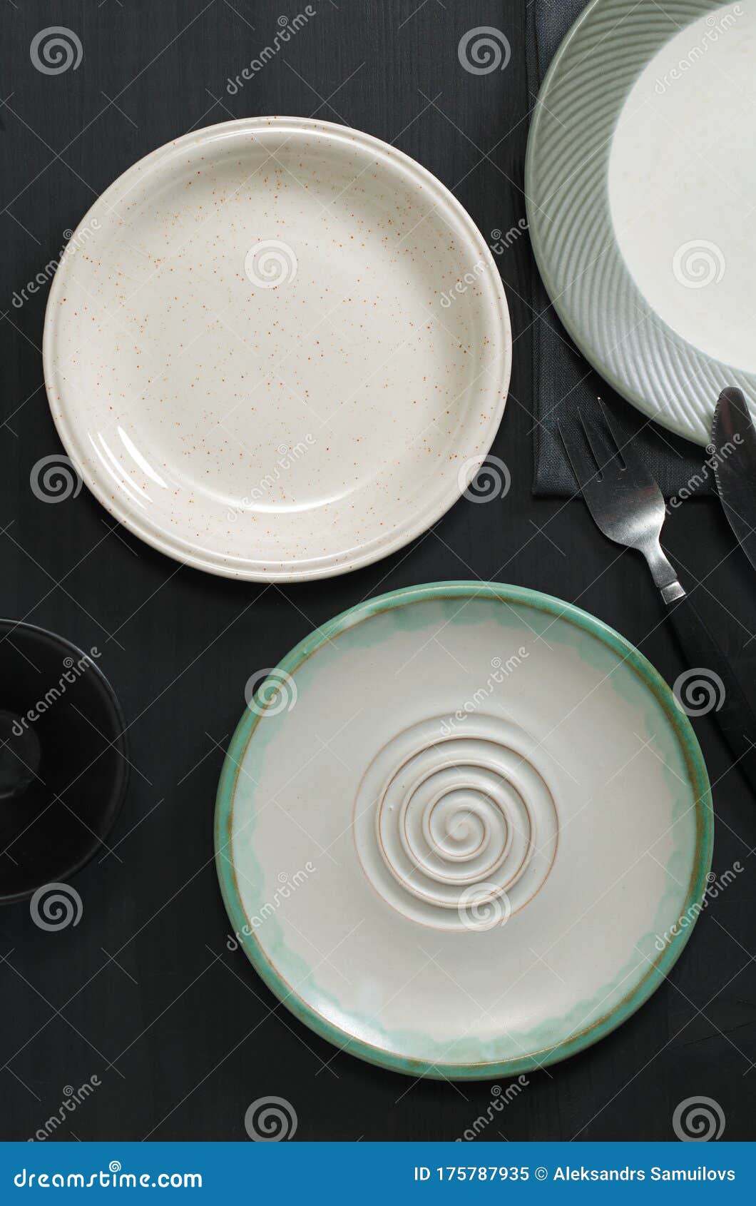Various plates on table stock image. Image of utensil - 175787935