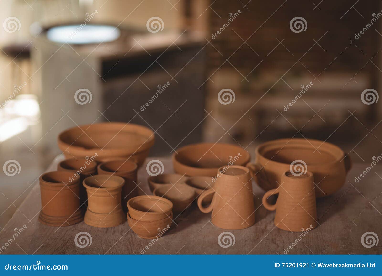 Various pottery on table stock image. Image of clay, wooden - 75201921