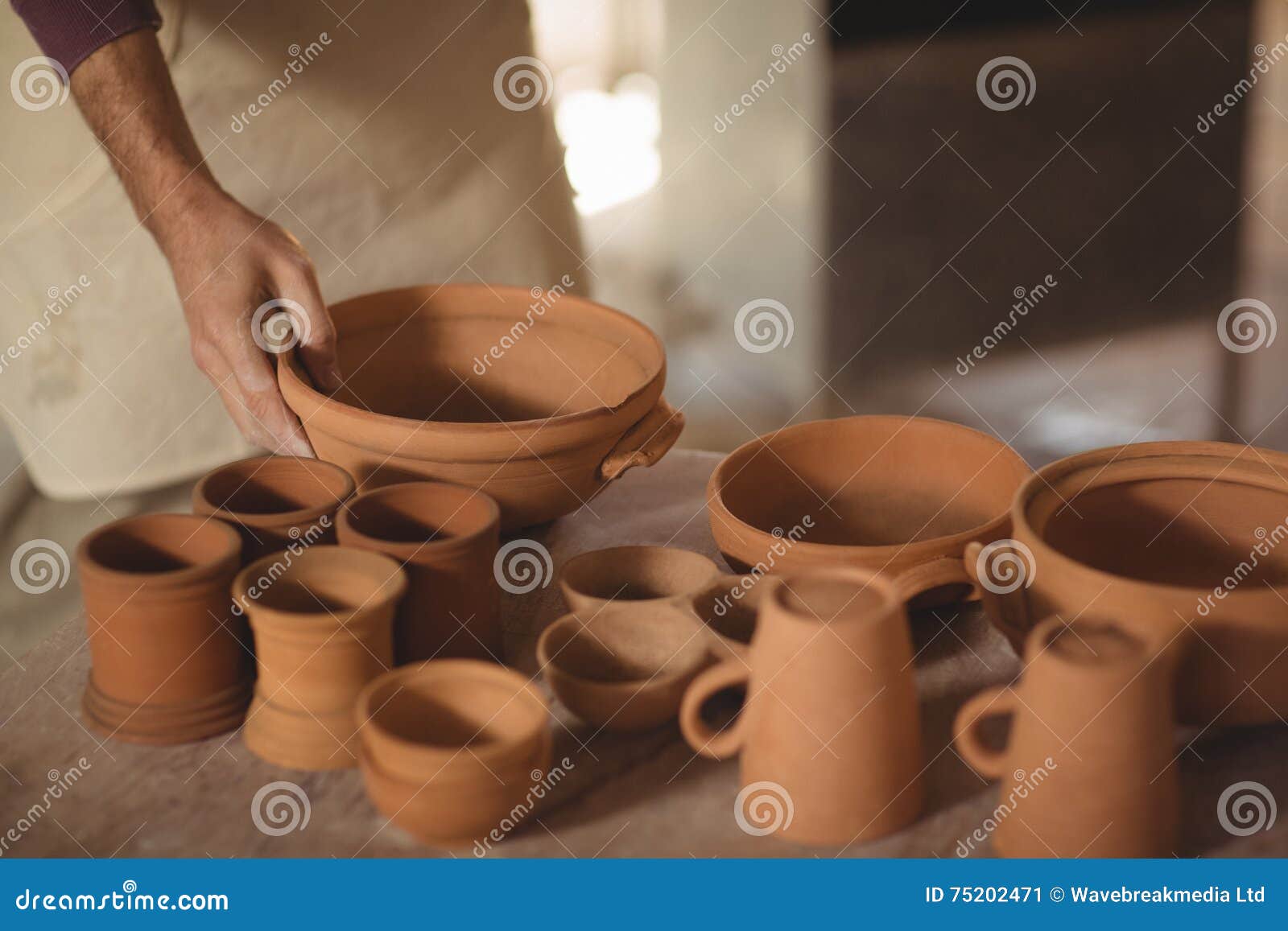 Various pottery on table stock image. Image of craft - 75202471