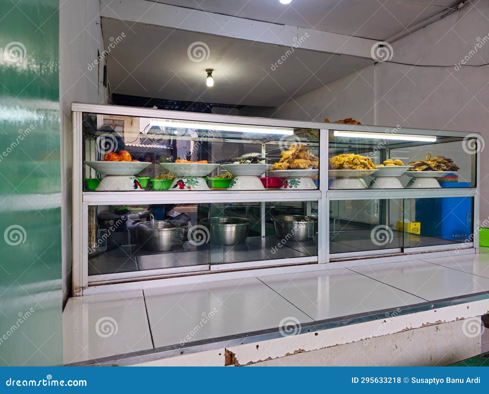 Various Ready-to-eat Side Dishes are Presented in the Glass Display of ...