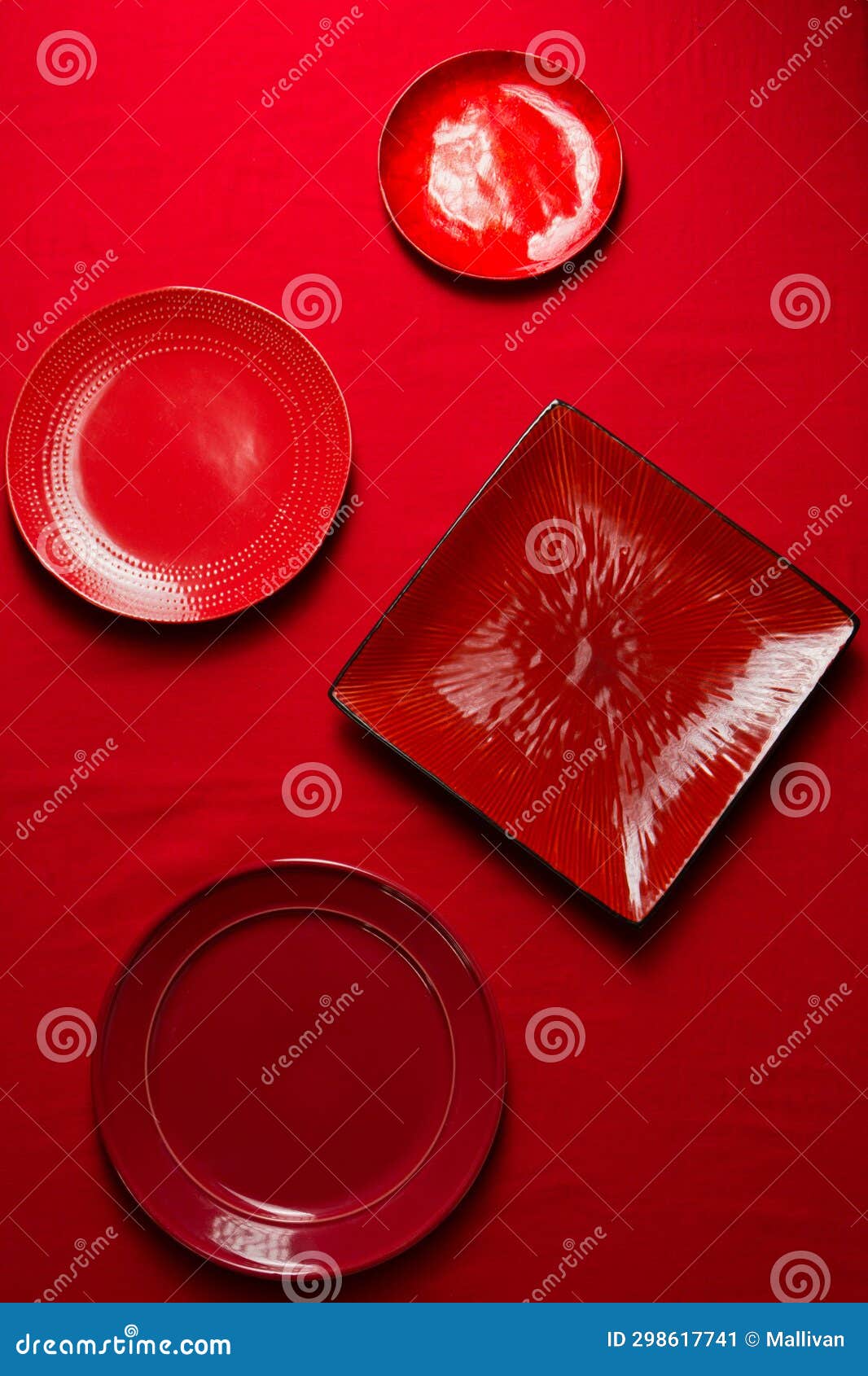 Various Red Plates on a Red Tablecloth on the Table Stock Image - Image ...