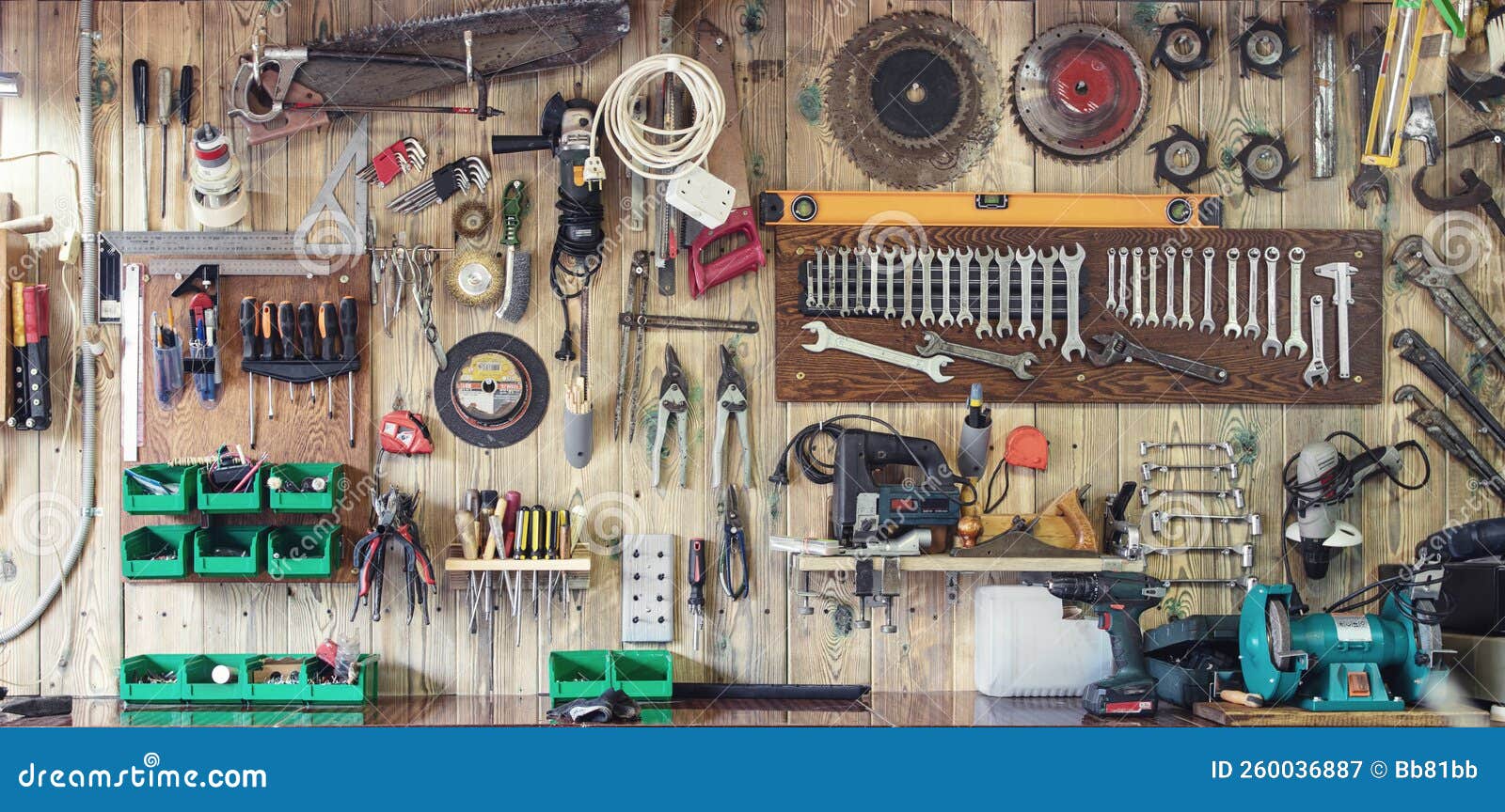 Various Tools Hang on a Wooden Wall in a Workshop Stock Image - Image ...