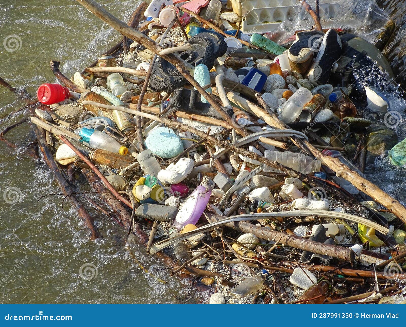 Various Rubbish on a River. Waste on the River Stock Photo - Image of ...