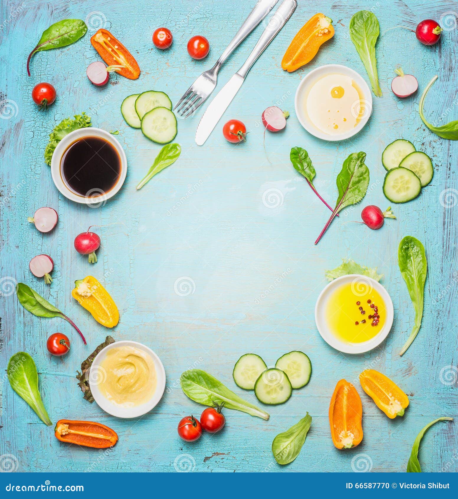 Various Salad and Dressing Ingredients on Light Blue Background Stock ...