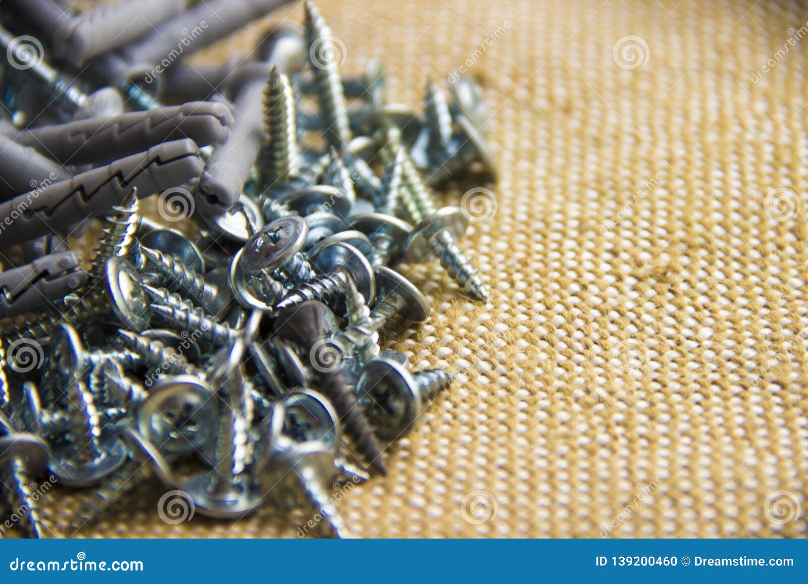 Various Screws with Dowels and Screws Lined on Burlap. Many Screws ...