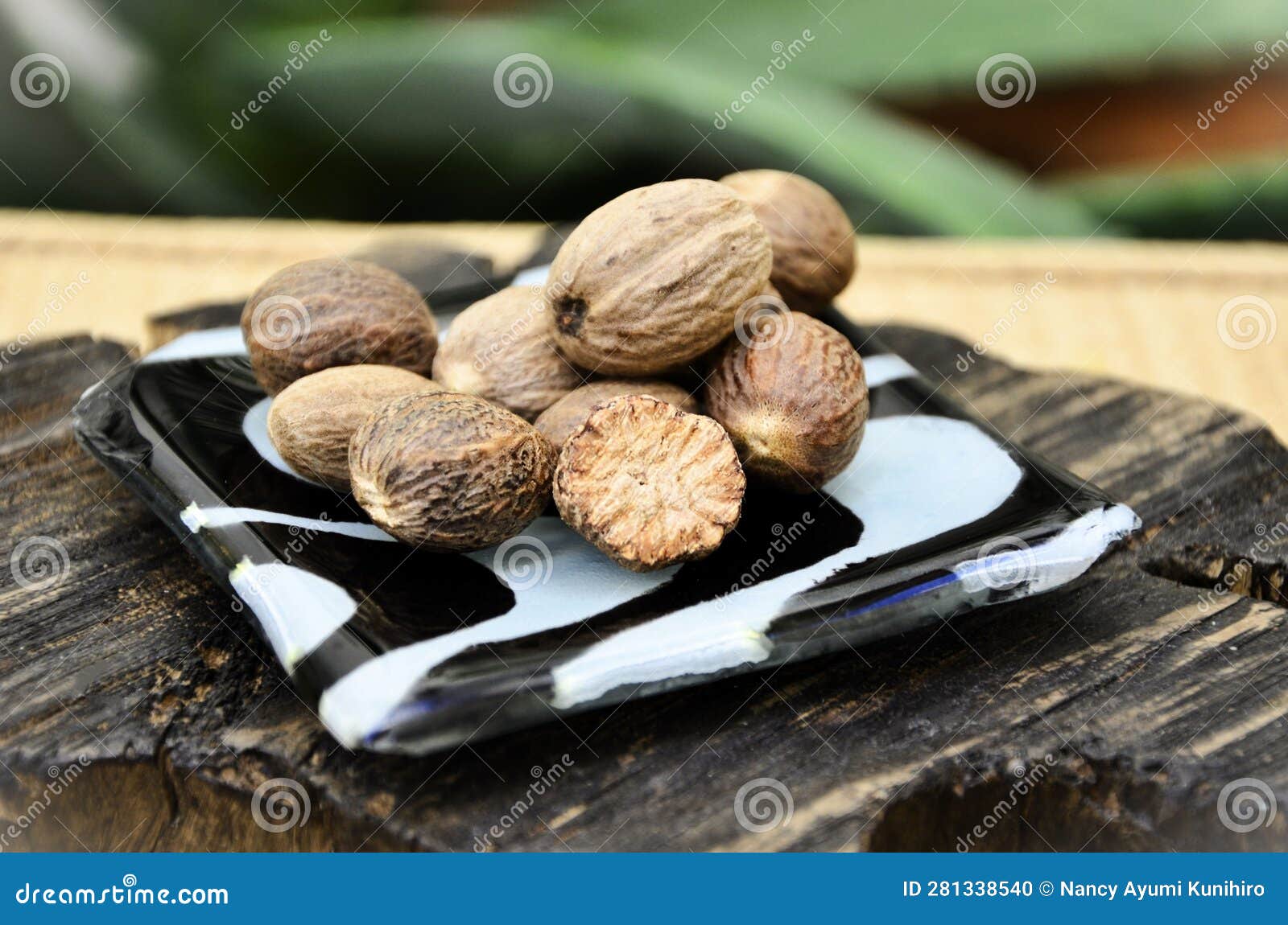 Various Seeds of Myristica Fragrans in Small Plate Stock Photo - Image ...