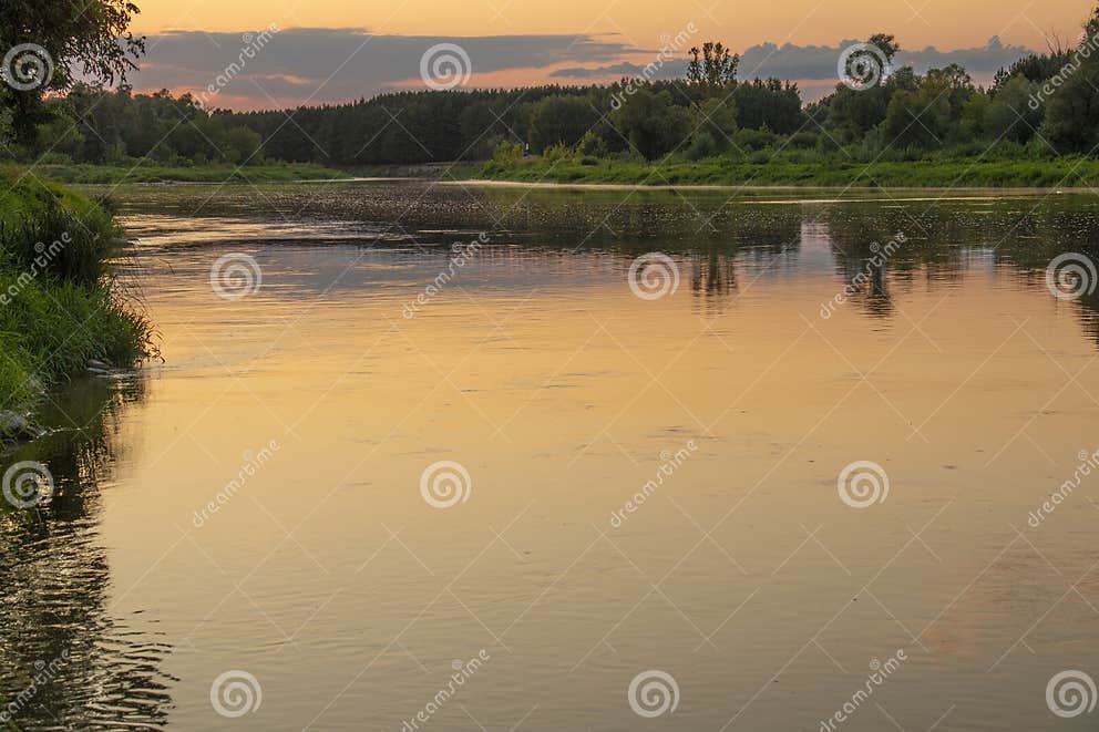 Sunset over the Bug river stock image. Image of view - 287834005