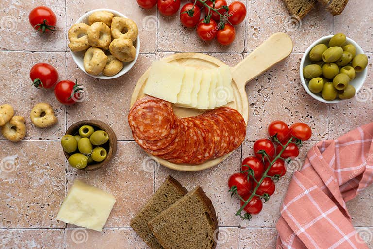 Various Snacks on Beige Tile Background, Top View Stock Image - Image ...