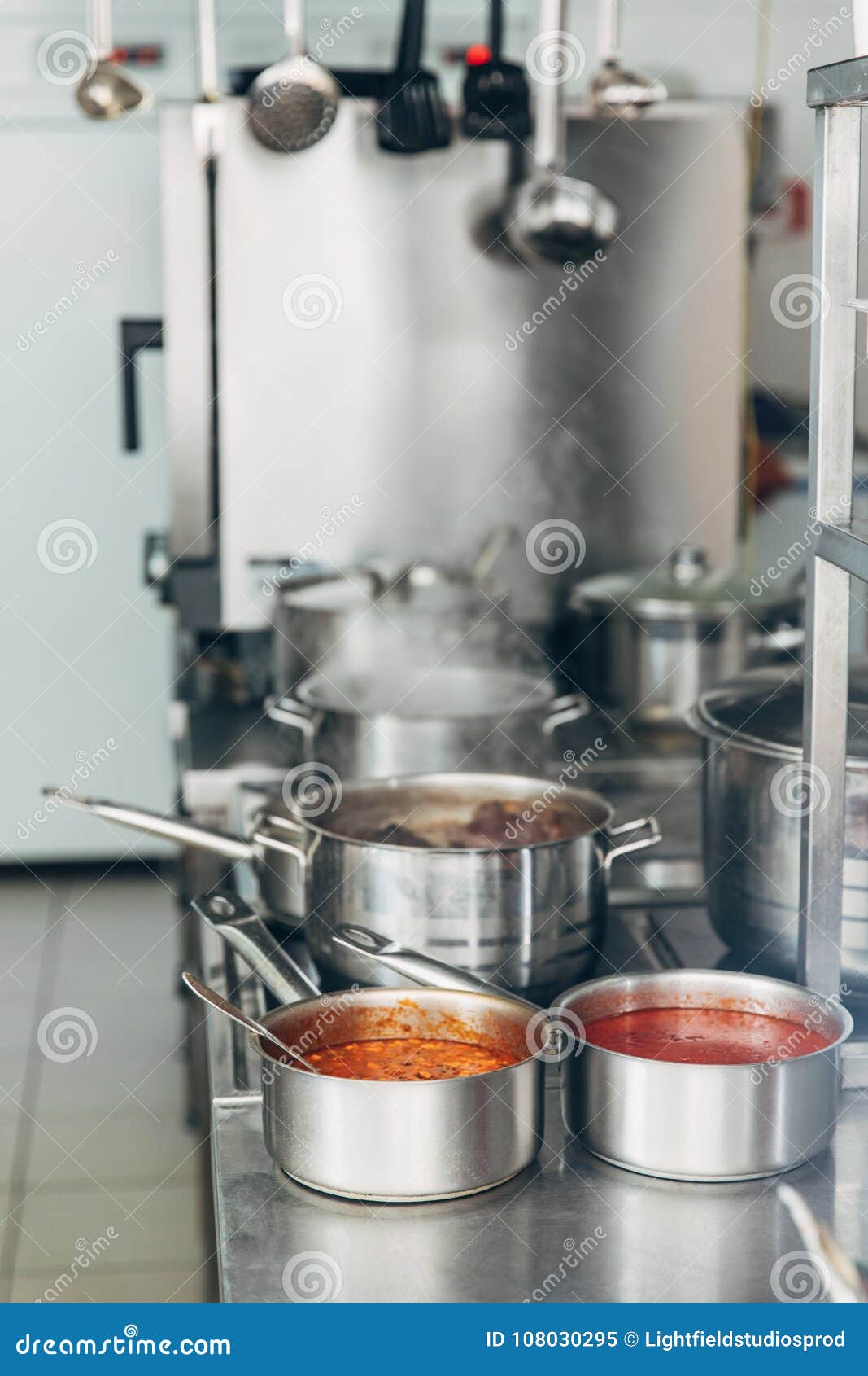 Soup Cooking in Sauce Pans at Restaurant Kitchen Stock Image - Image of ...