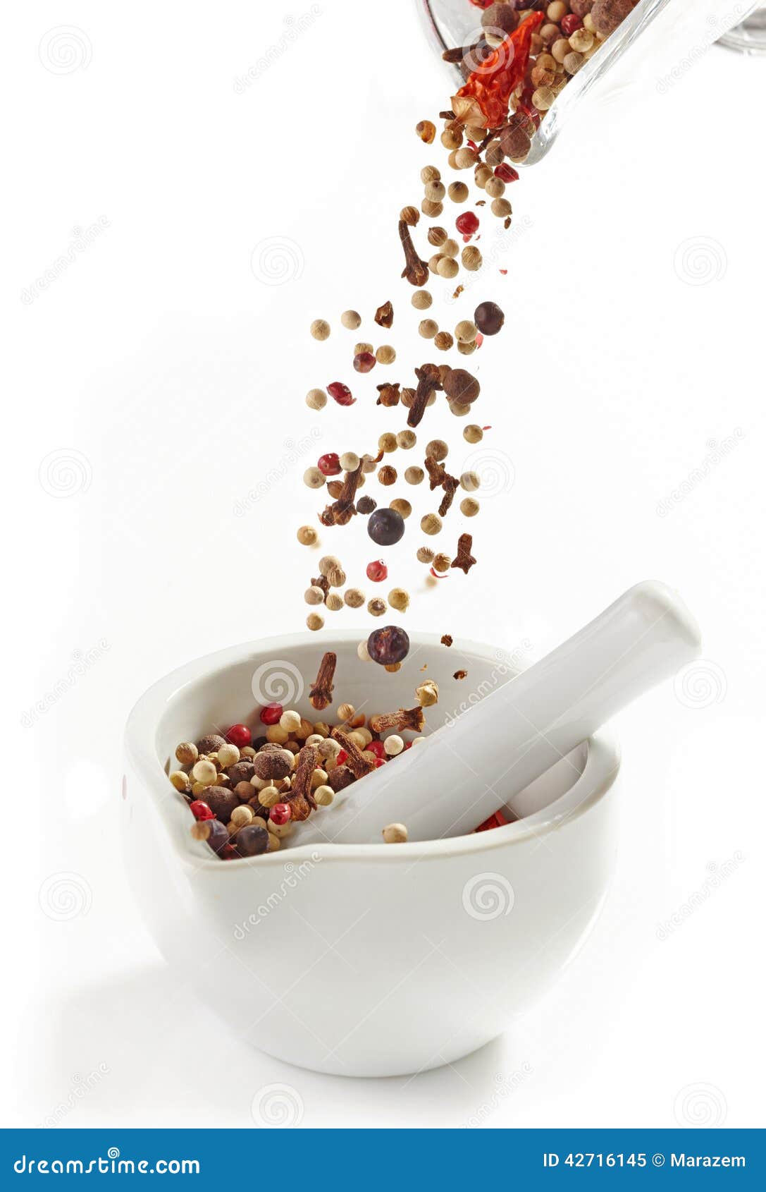 Various Spices Falling into Mortar and Pestle Stock Image - Image of ...