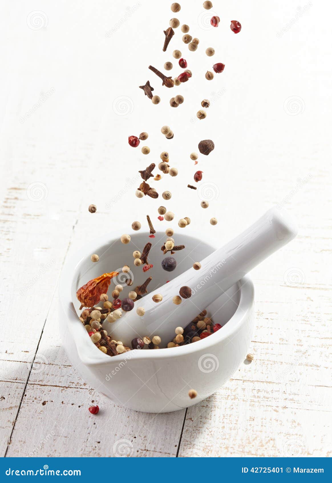 Various Spices Falling into Mortar and Pestle Stock Image - Image of ...