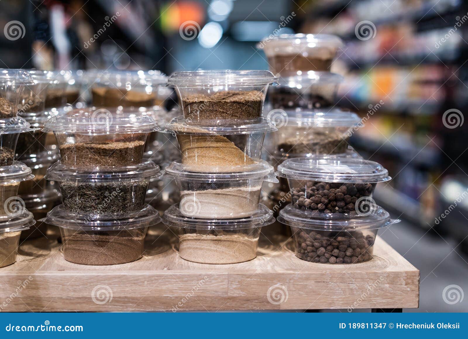 Various Spices and Herbs Packed in Small Transparent Plastic Boxes ...