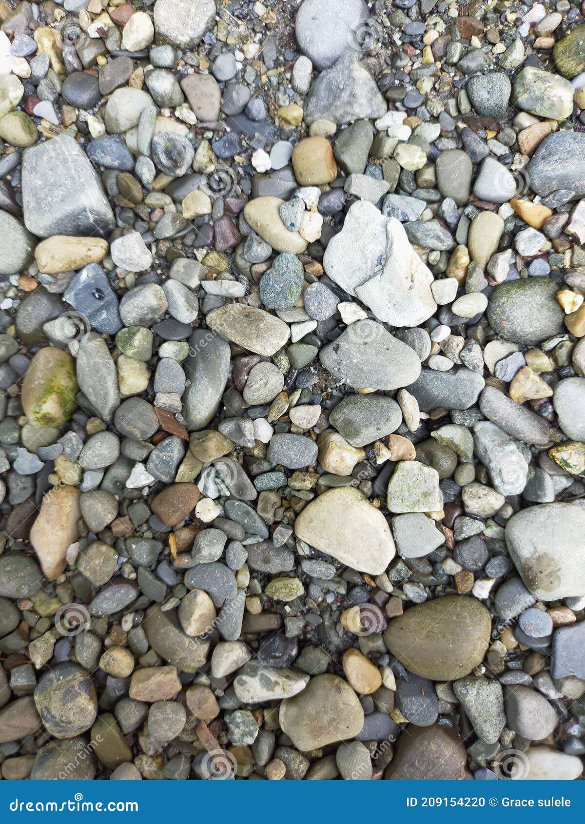 Various Stone Sizes and Colors in the Ground Stock Photo - Image of ...