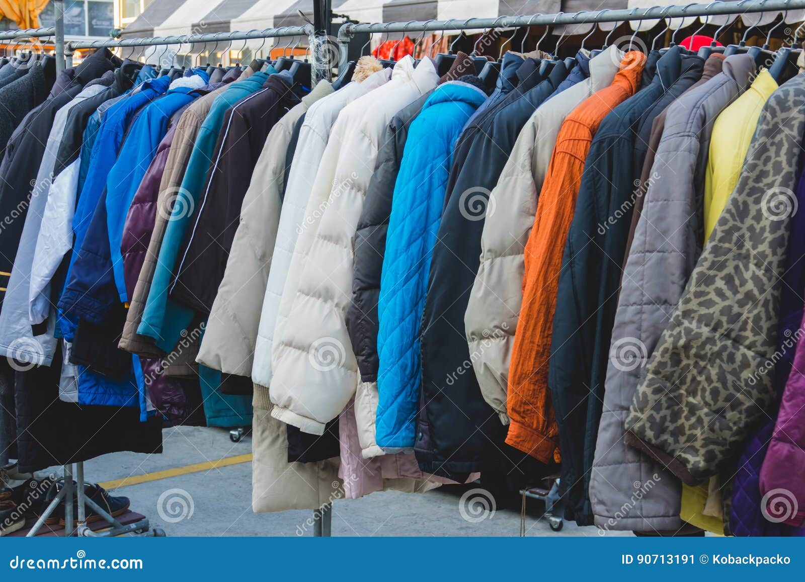 Various Style Winter Cloth on Rack in Winter Shop. Stock Image - Image ...