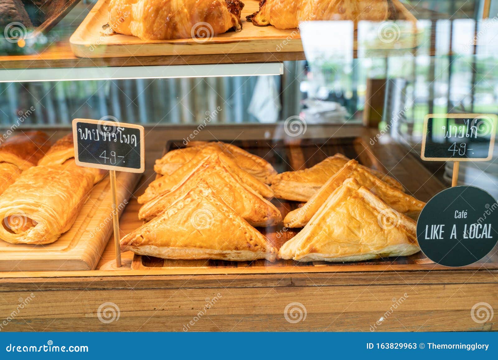 Various Sweet Bakery With Sausage And Chocolate In Glass Box Royalty ...