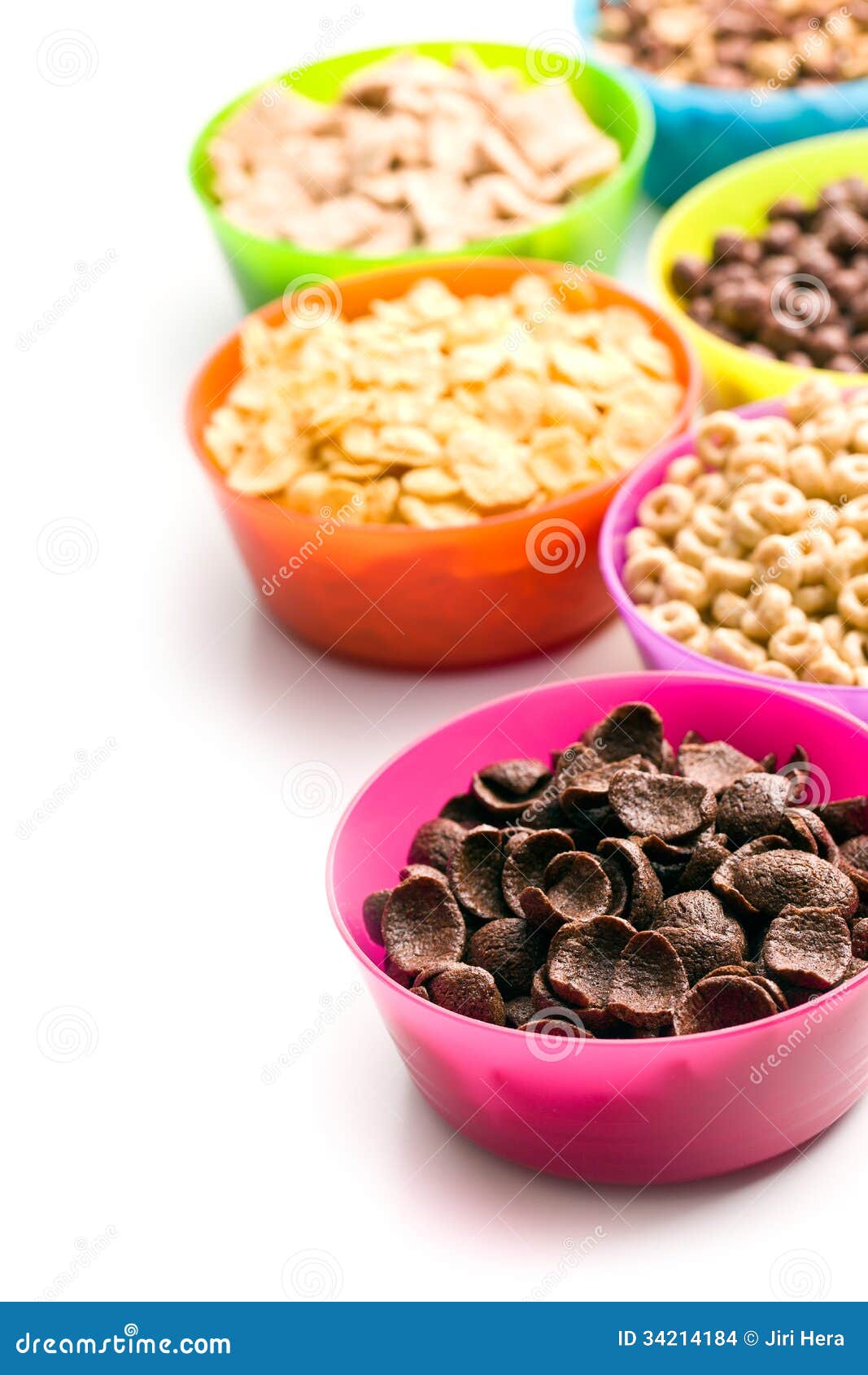 Various Sweet Cereals in Colorful Bowls Stock Photo - Image of ...