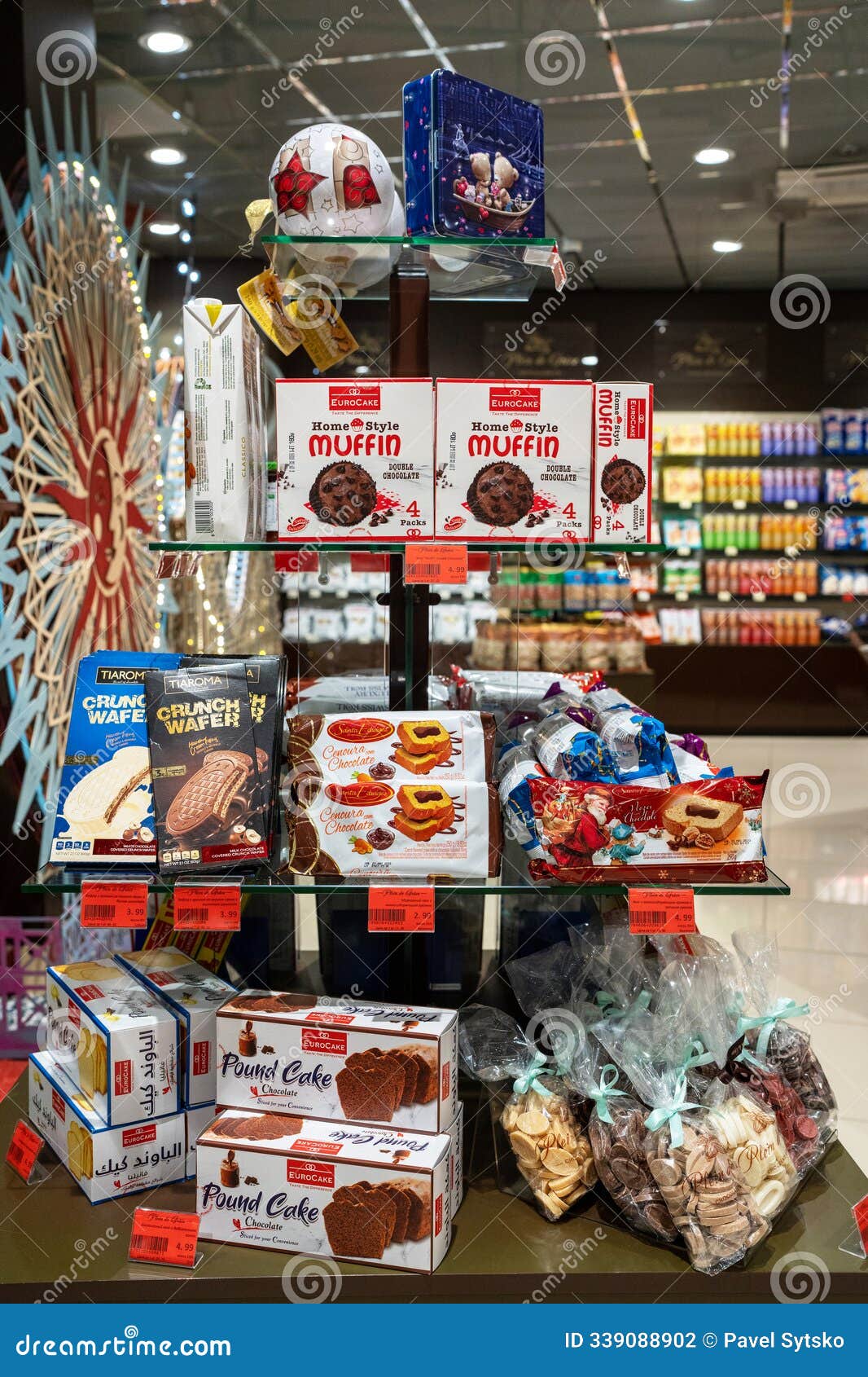 Various Sweets, Biscuits, Chocolates are Presented on Shelves of ...