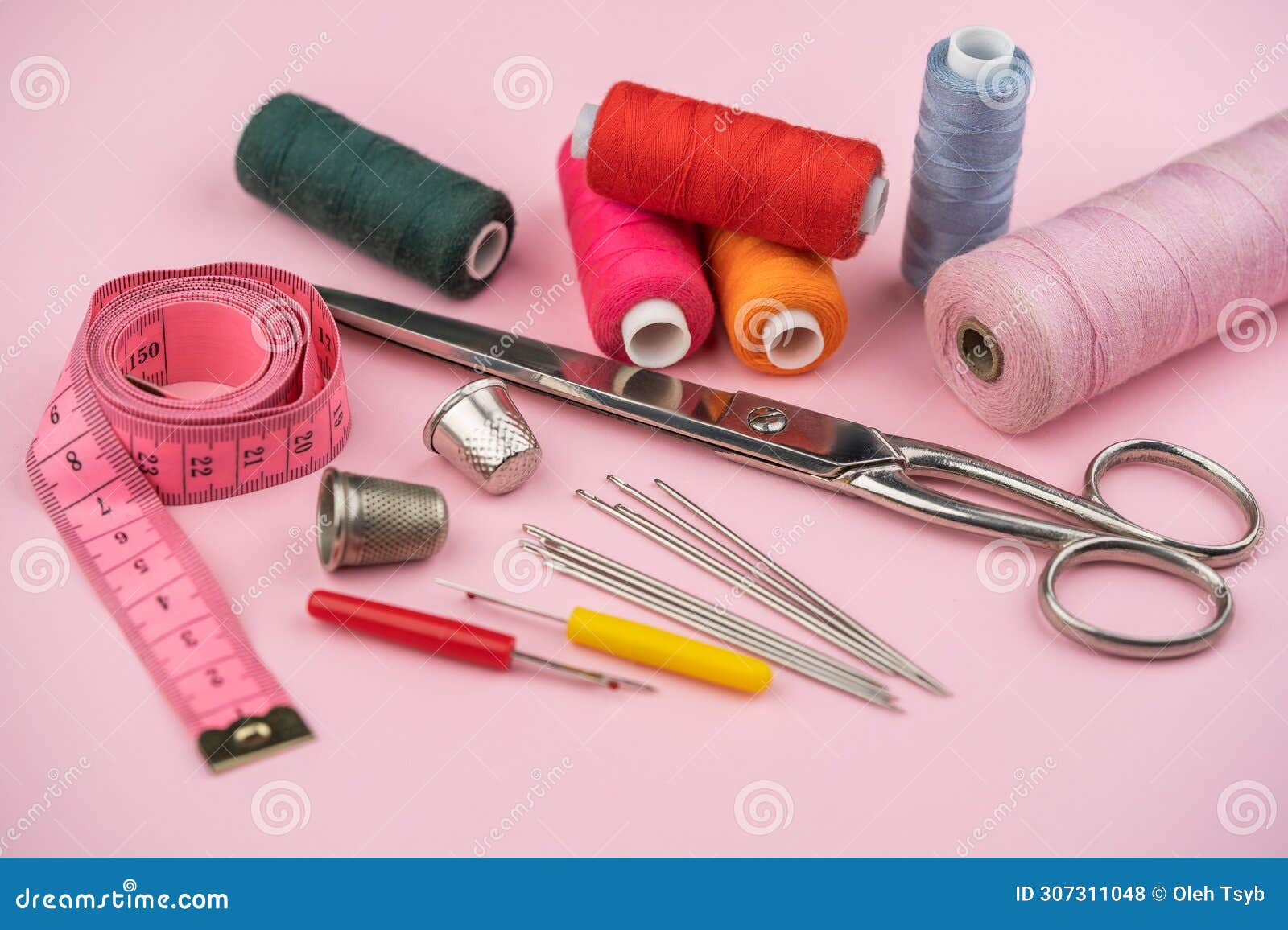 Various Tailor Accessories and Tools for Tailoring on a Pink Background ...