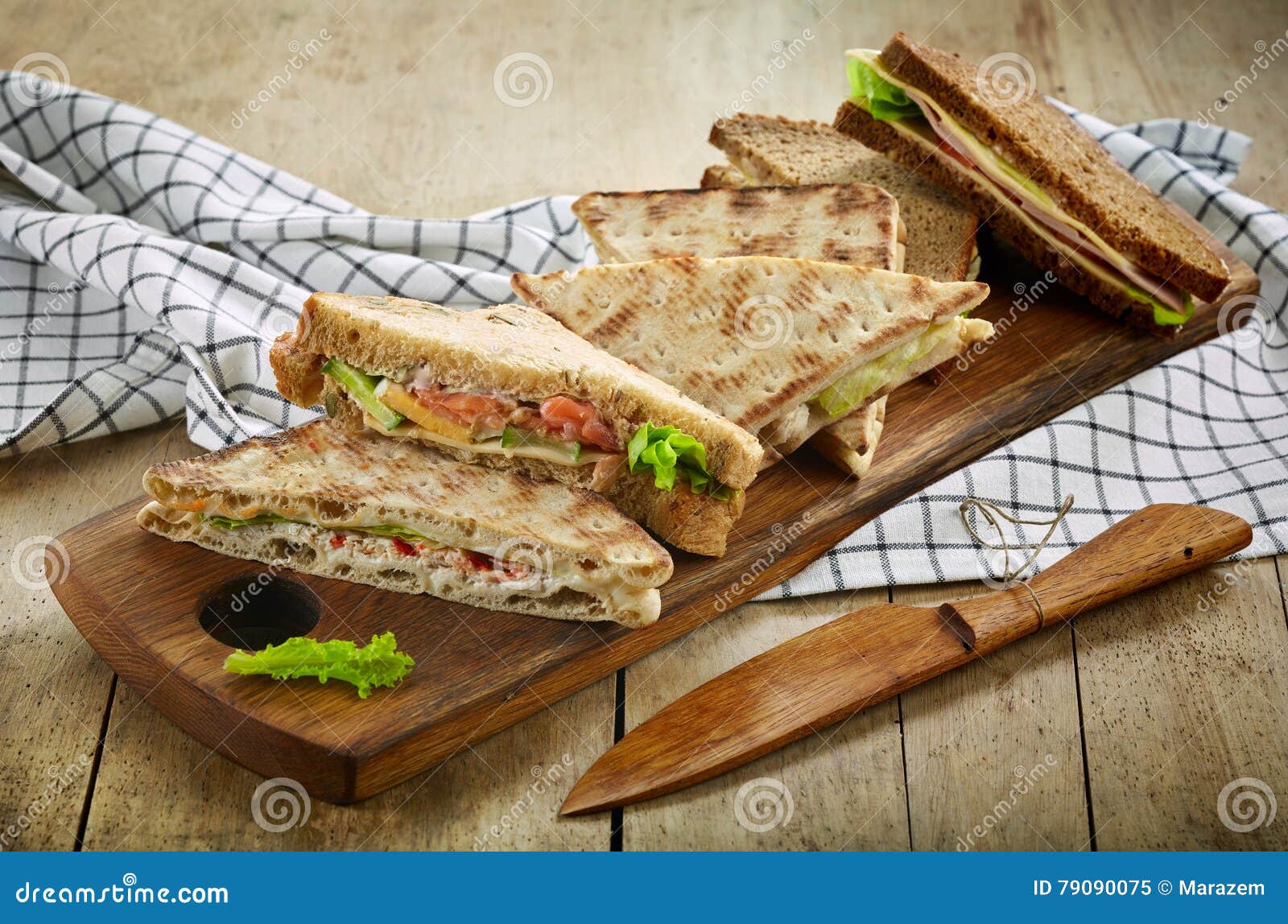 Various Triangle Sandwiches on Wooden Board Stock Image - Image of ...