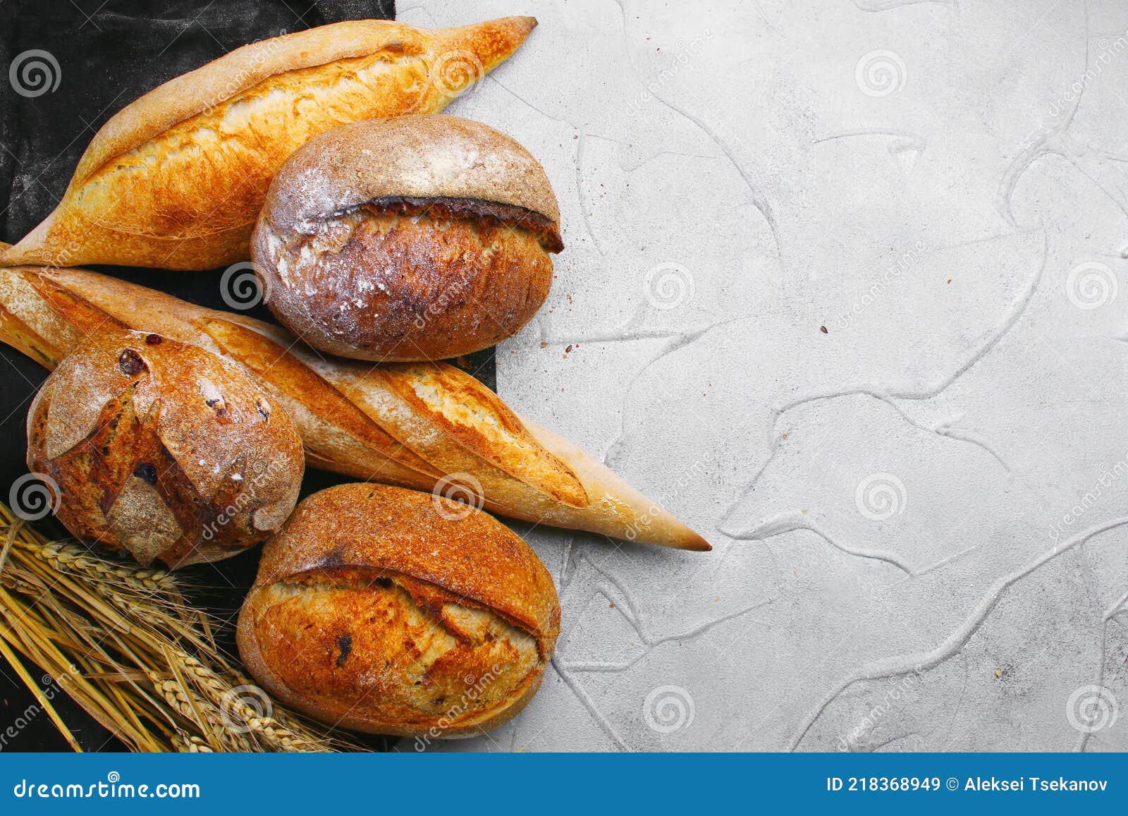 Various Types of Bread on Concrete Background with Copy Space, Top View ...
