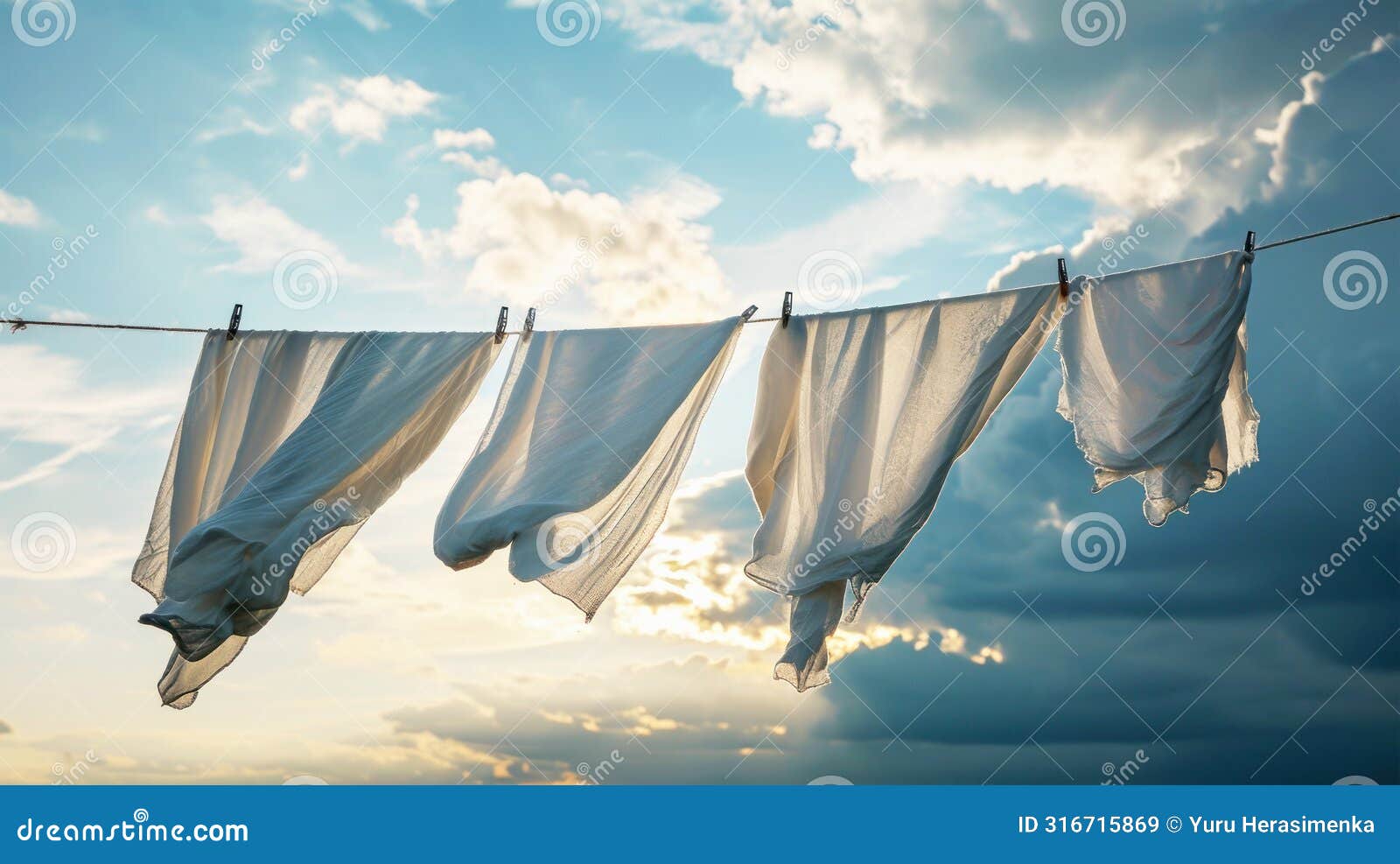 Various Types of Clothes, Such As Linen and Laundry, are Hanging from a ...