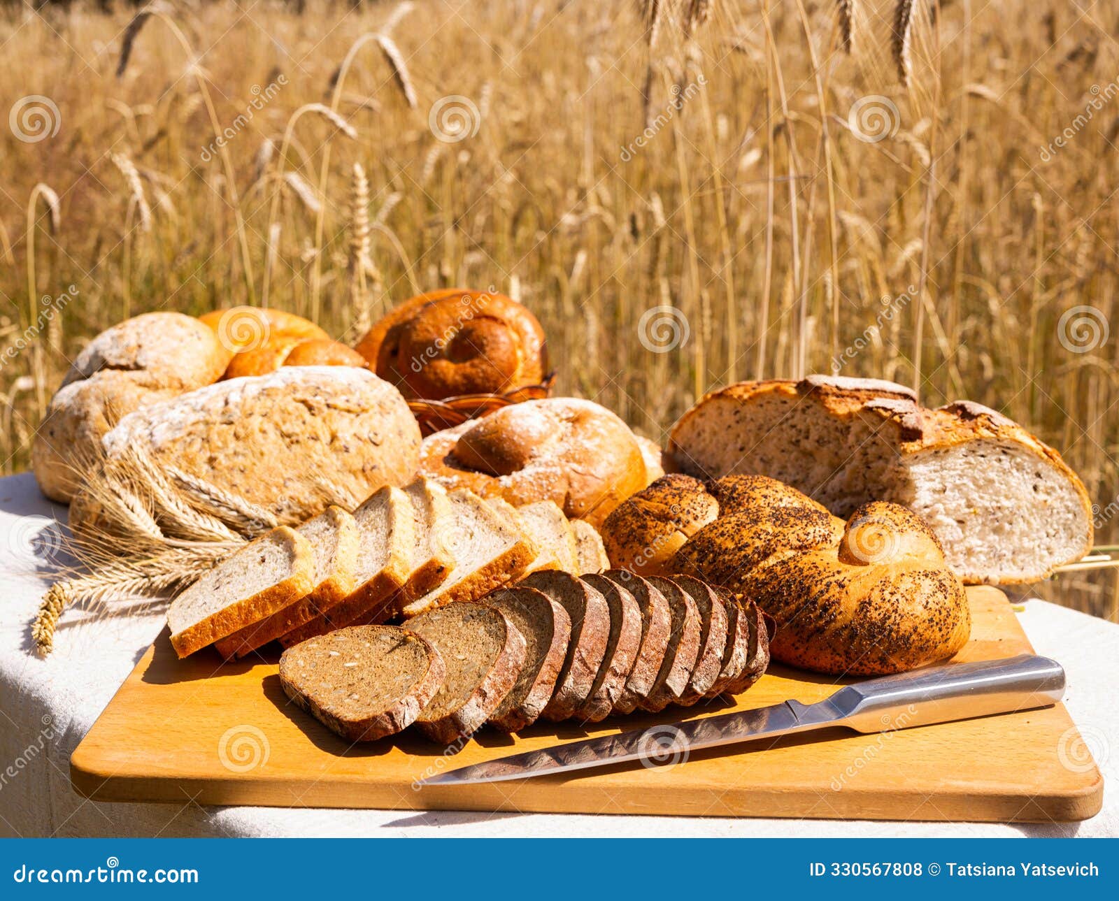Lot of Different Flavored Bread, Wheat, Rye, on the Table in the Field ...