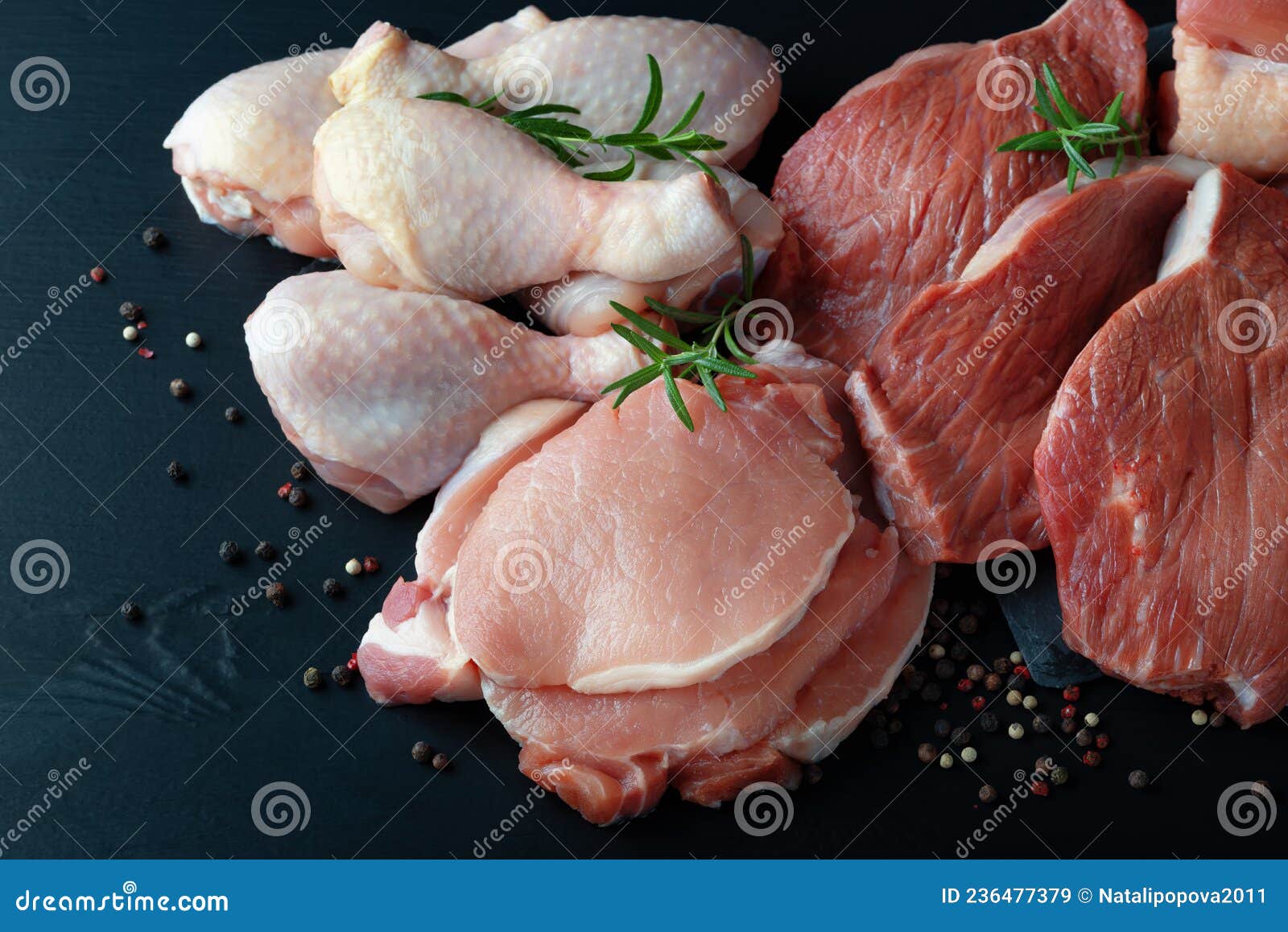 Various Types of Fresh Meat: Pork, Beef, and Chicken on a Black Table ...