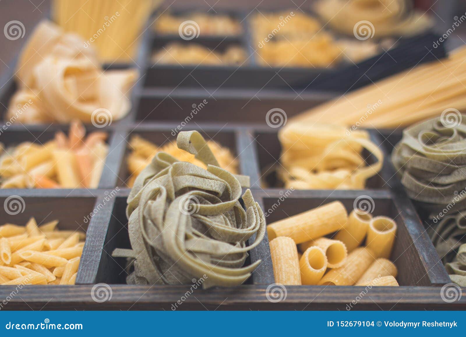 Various Types of Italian Pasta in a Wooden Box with Different Cells ...