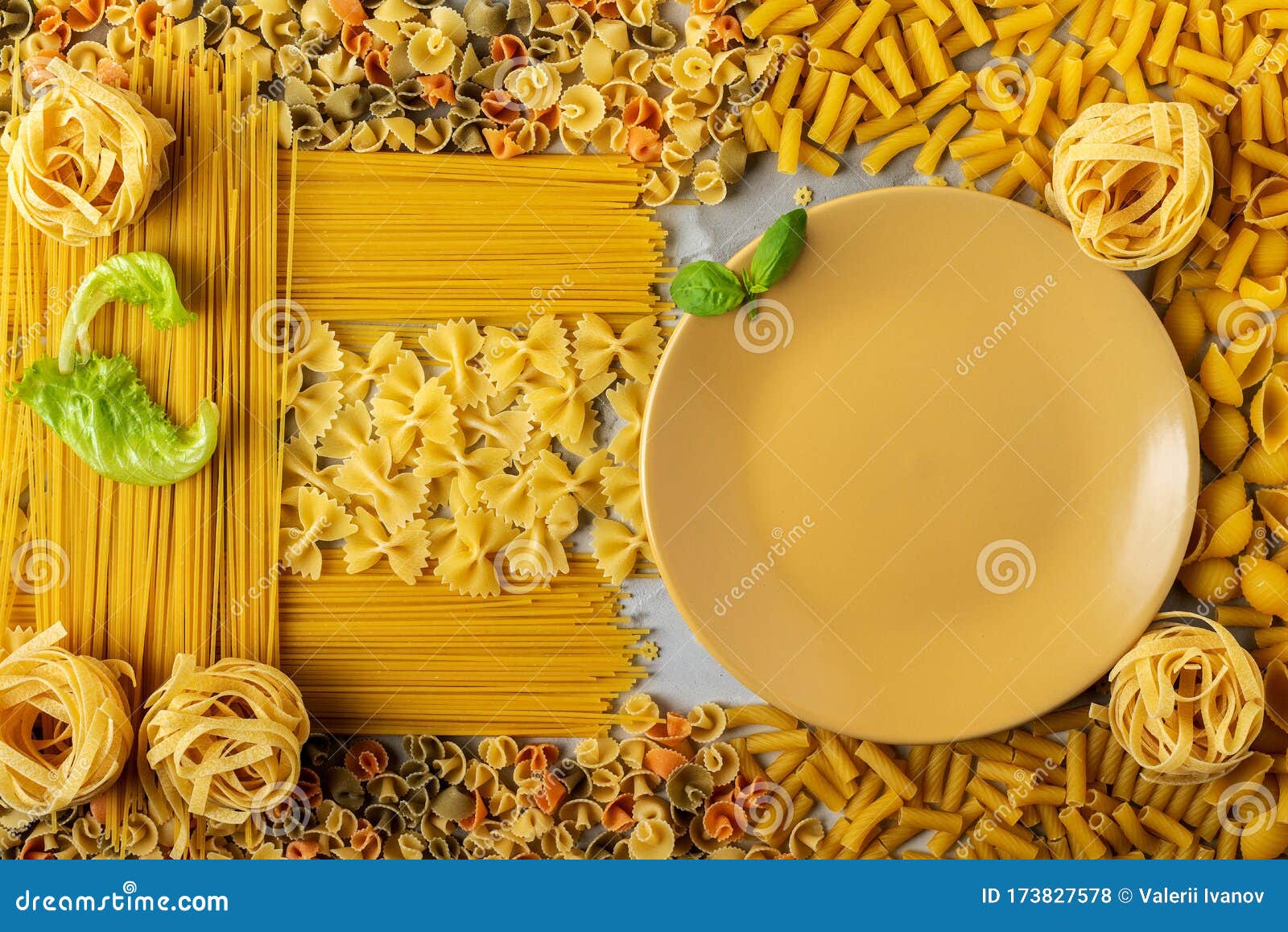 Various Types of Pasta with Lettuce and Basil Leaves and an Empty ...