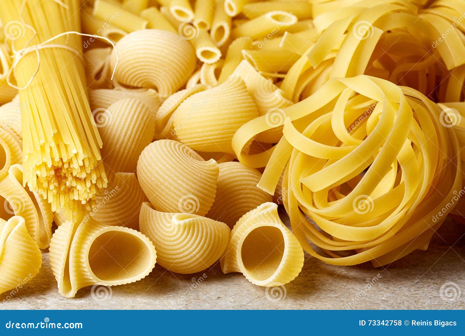 Various Types of Pasta on Stone Table Stock Photo - Image of ...