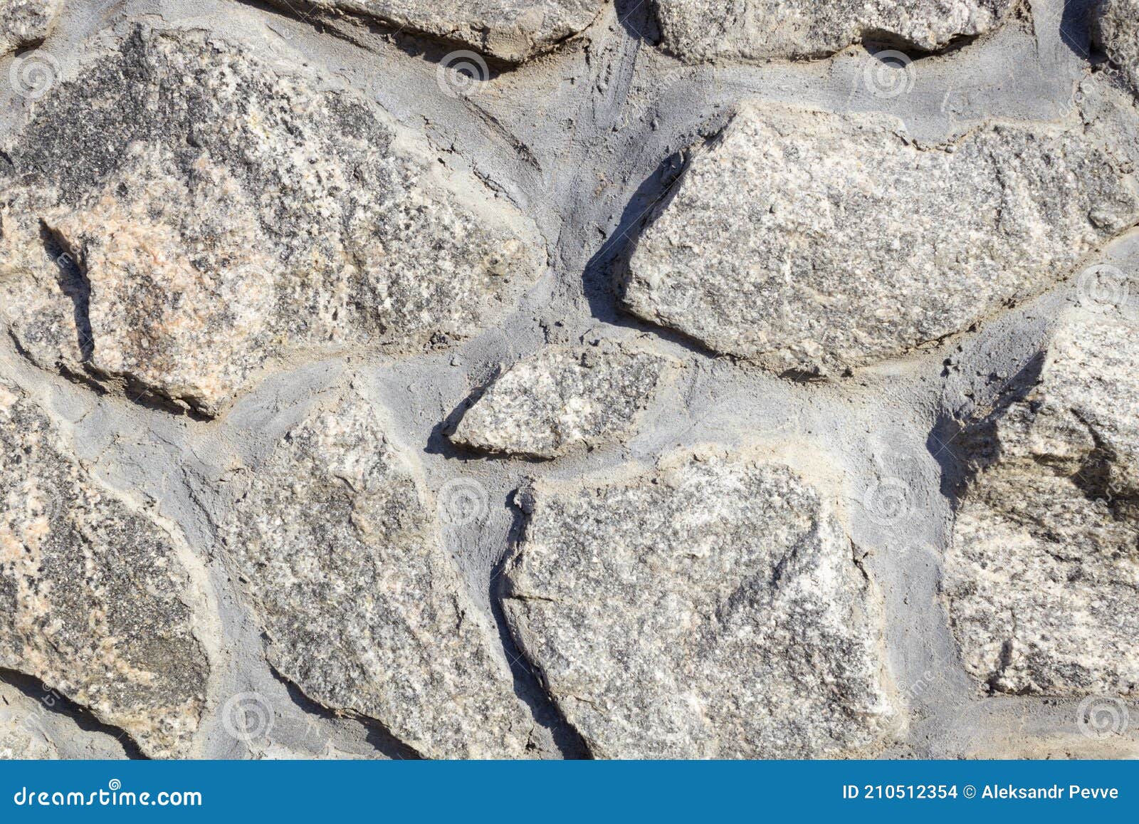 Various Types of Stones are Stacked and Poured into a Pattern for a ...