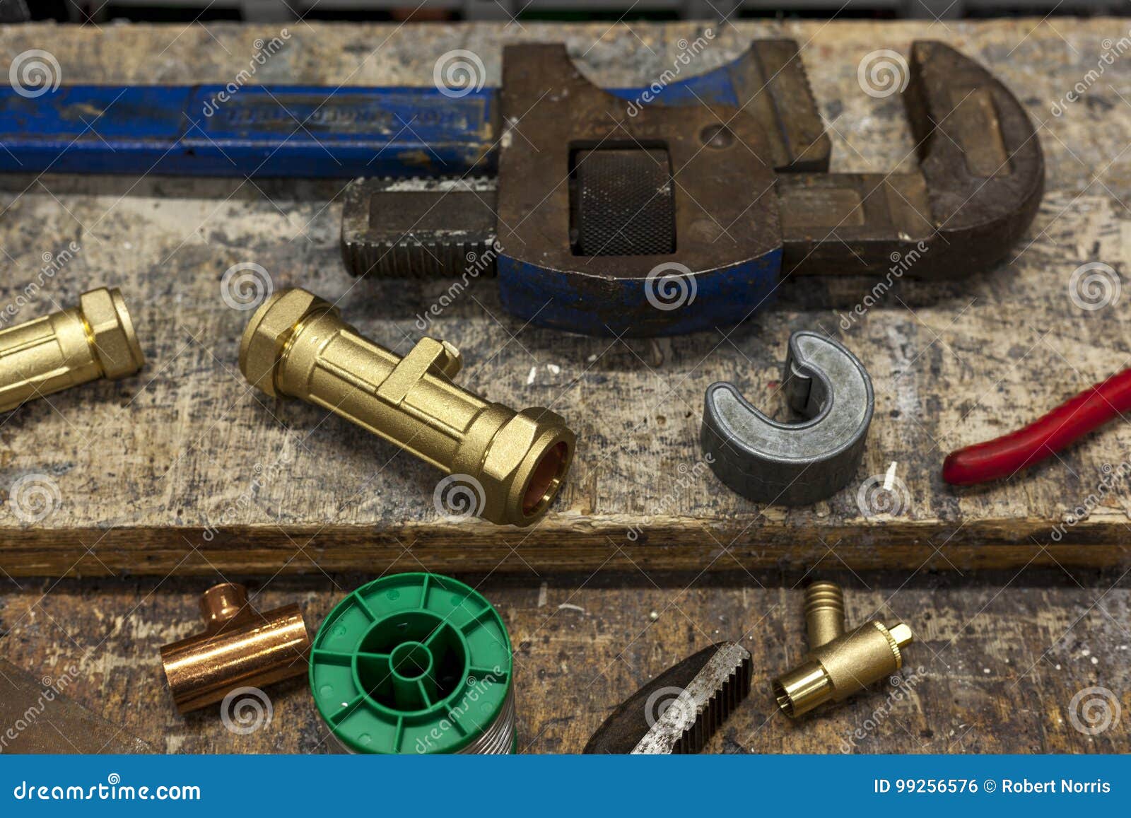 Various Valves and Wrenches on a Plumbers Workbench Stock Photo - Image ...