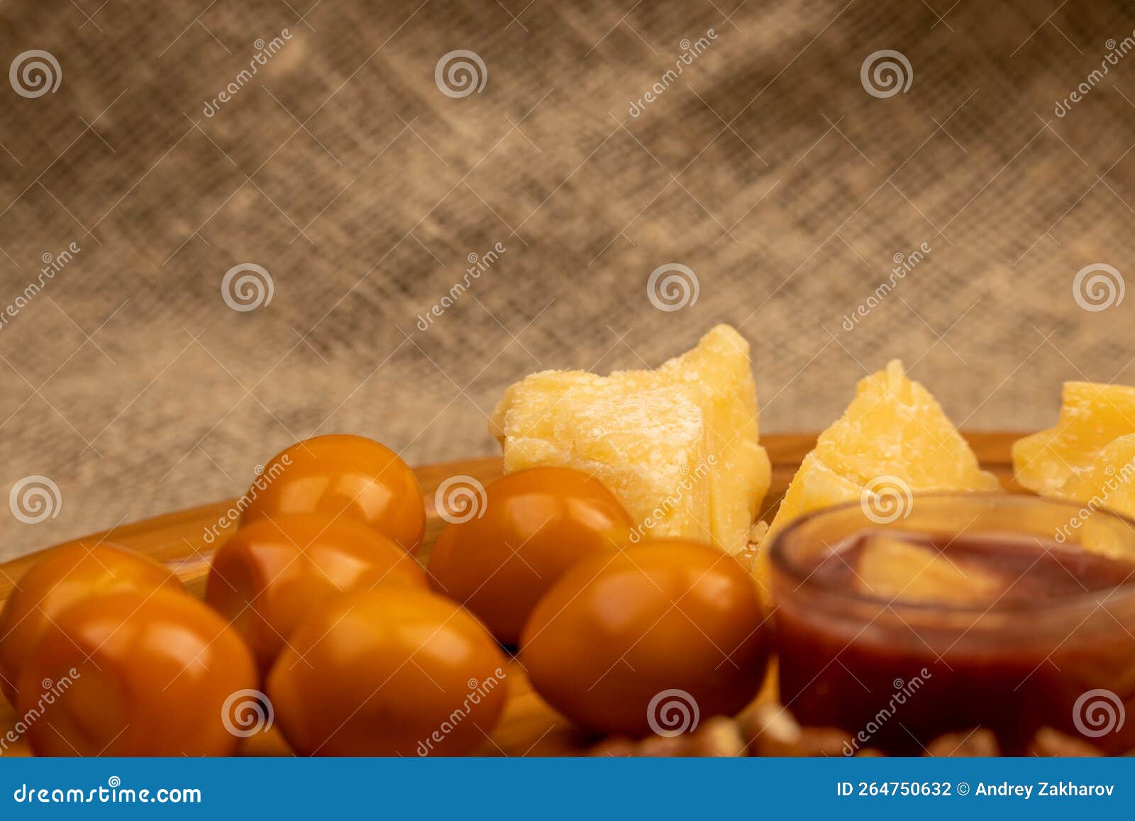 Various Varieties of Cheese, Walnut Kernels and Smoked Quail Eggs on a ...