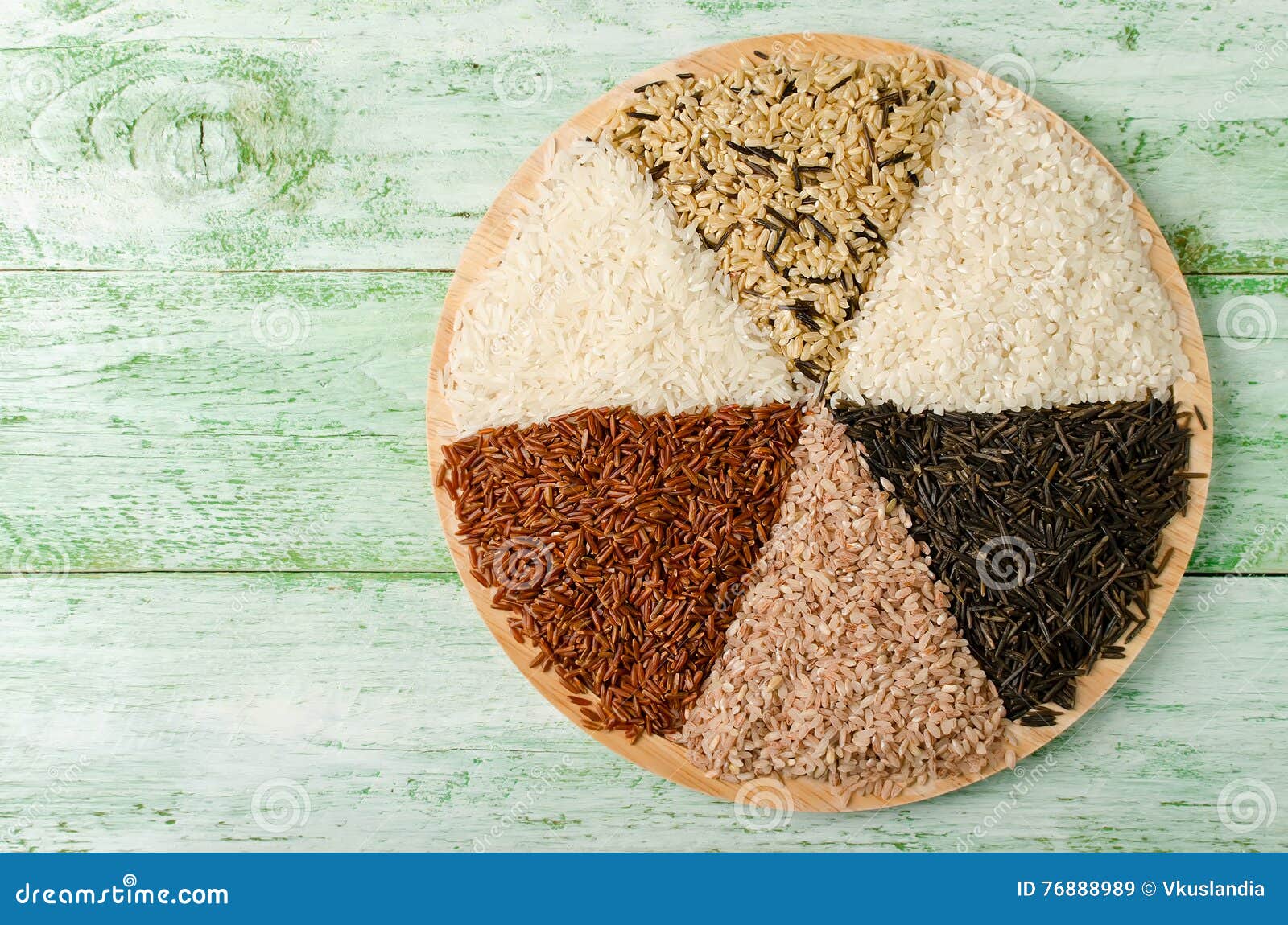 Various Varieties of Rice on a Wooden Table Stock Image - Image of heap ...