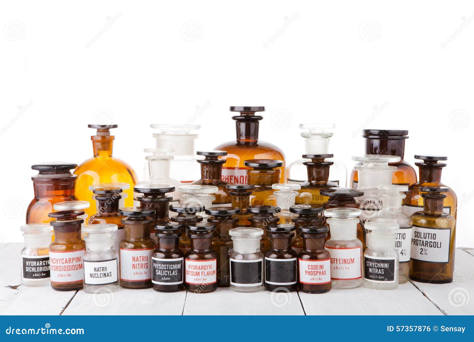 Various Vintage Pharmacy Bottles on Wooden Table in Pharmacy Stock ...