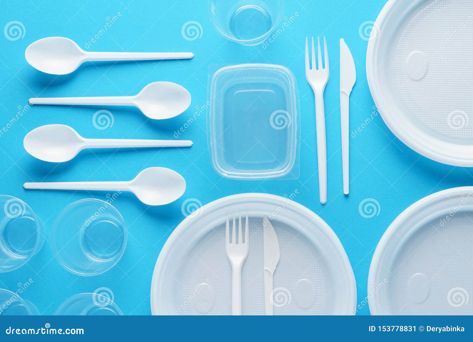 Various White Plastic Disposable Tableware on Blue Background Stock ...