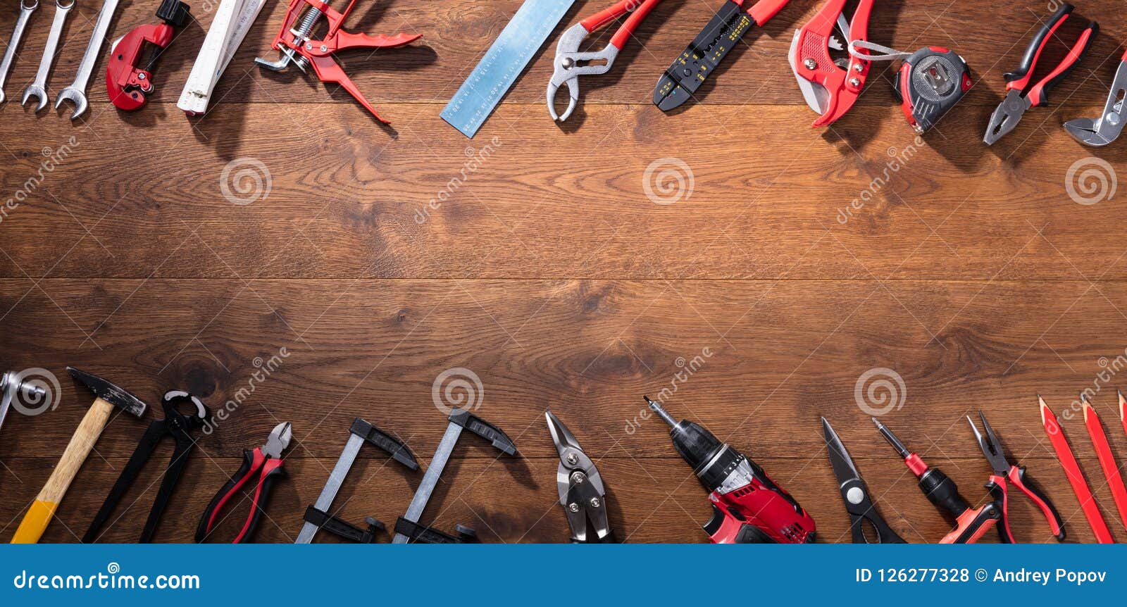 Various Worktools in a Row on Wooden Desk Stock Photo - Image of frame ...