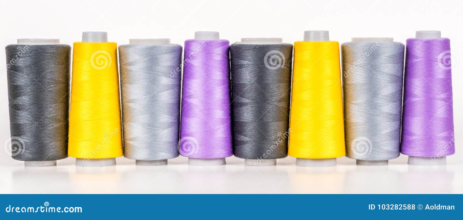 Vary colored thread coils stock photo. Image of fabric - 103282588